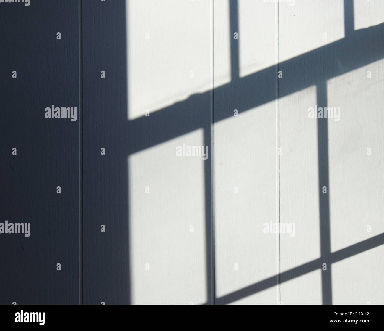 A Cast Shadow of Window Grids Stock Photo - Alamy
