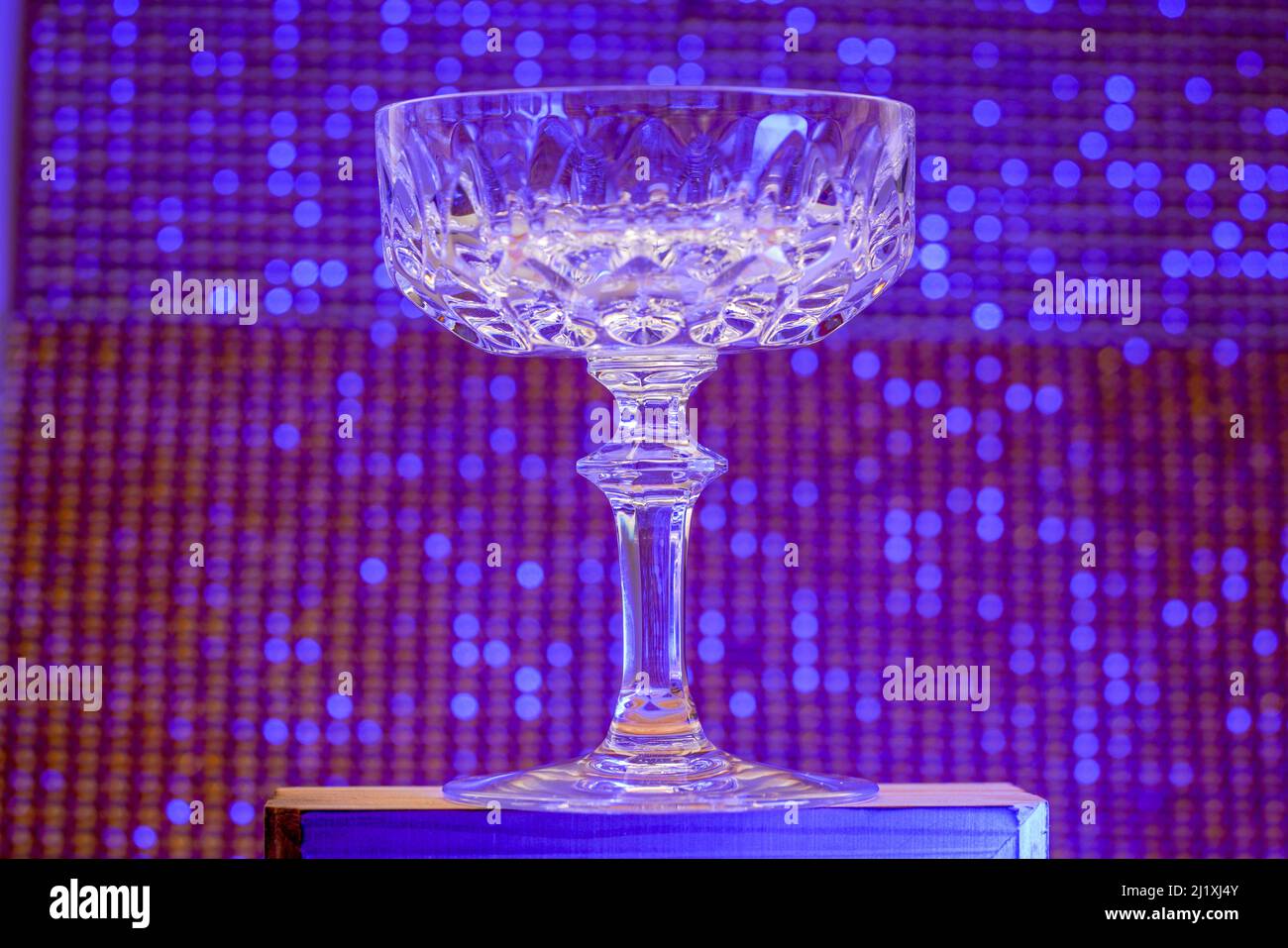 Glass lit from below with colored light creates consuming patterns to ...