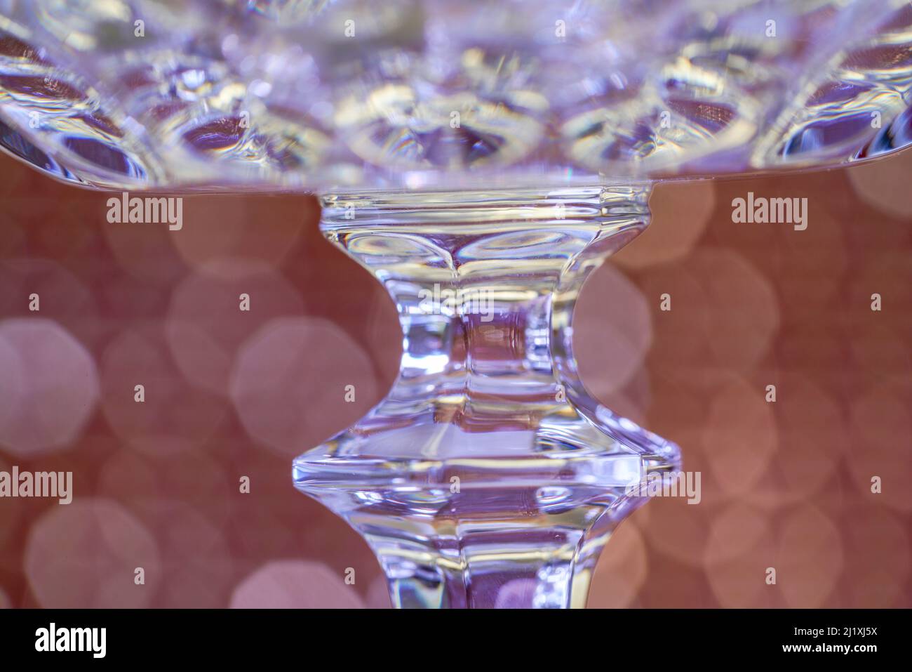 Glass lit from below with colored light creates consuming patterns to ...