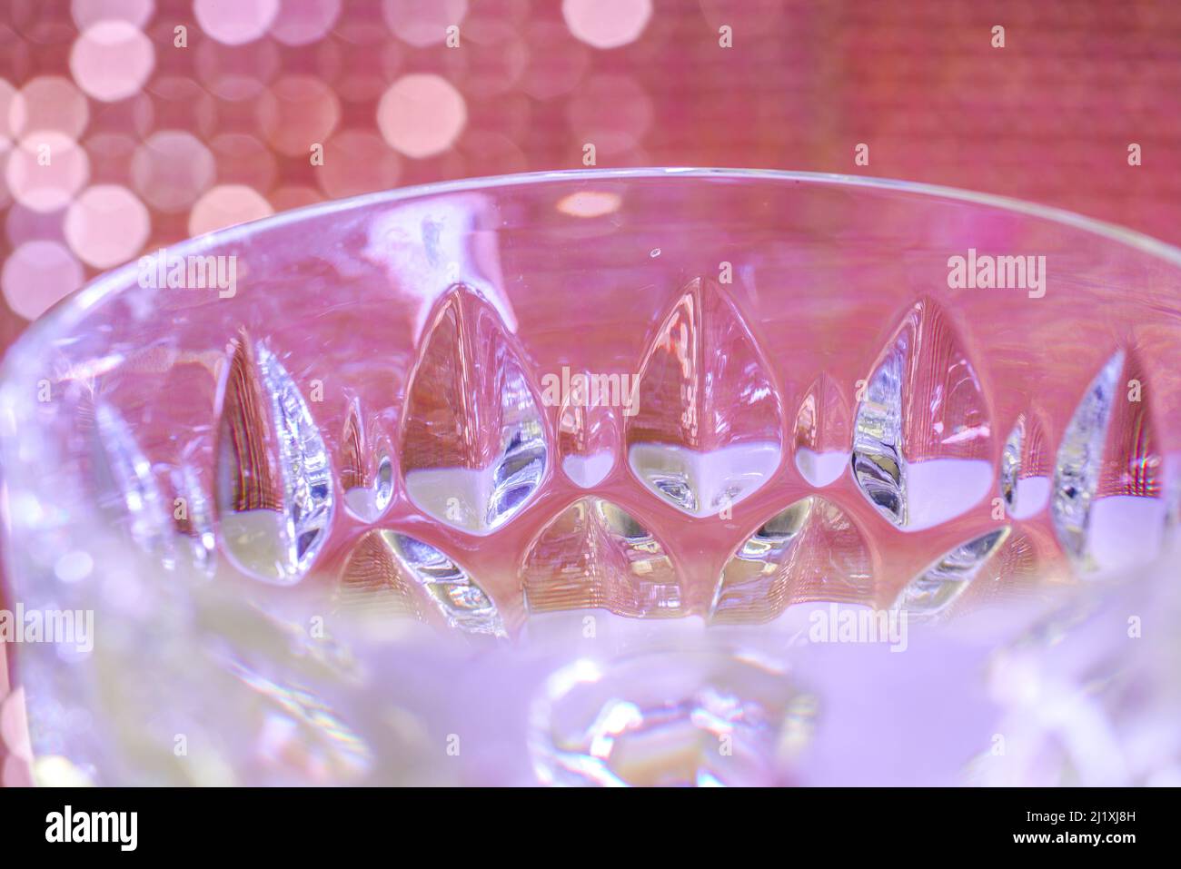 Glass lit from below with colored light creates consuming patterns to ...