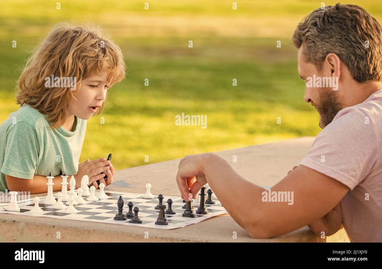 spending time together. strategic and tactic. tutorship. dad and kid ...