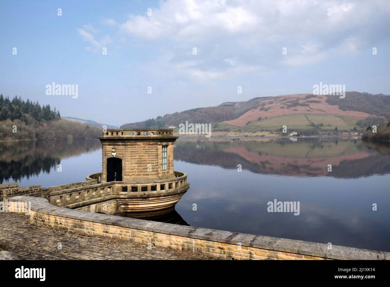 Water outlet tower on the Ladybower Reservoir dam, in the Dark Peak of ...