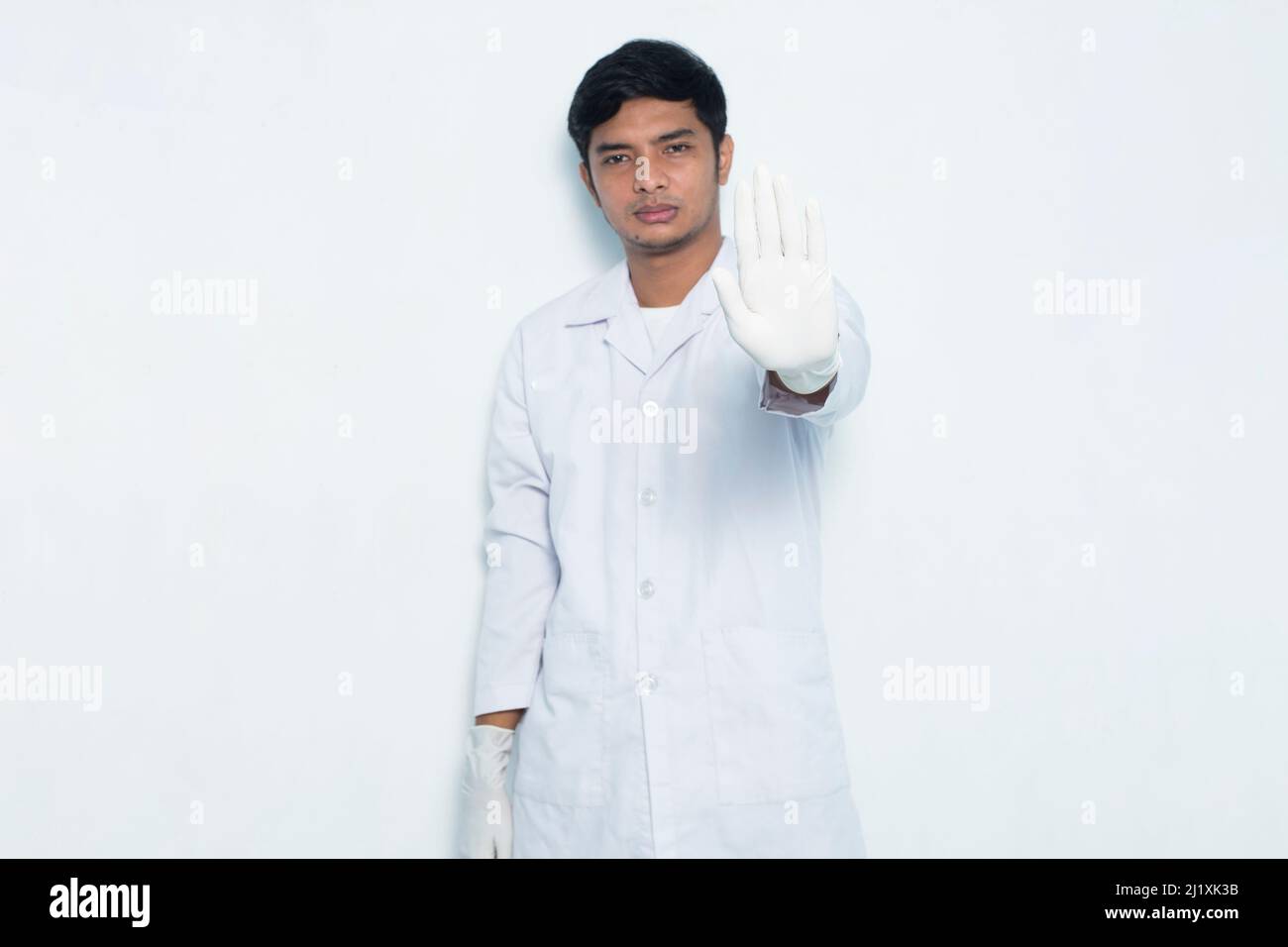 portrait of asian medical doctor open hand doing stop sign with serious ...