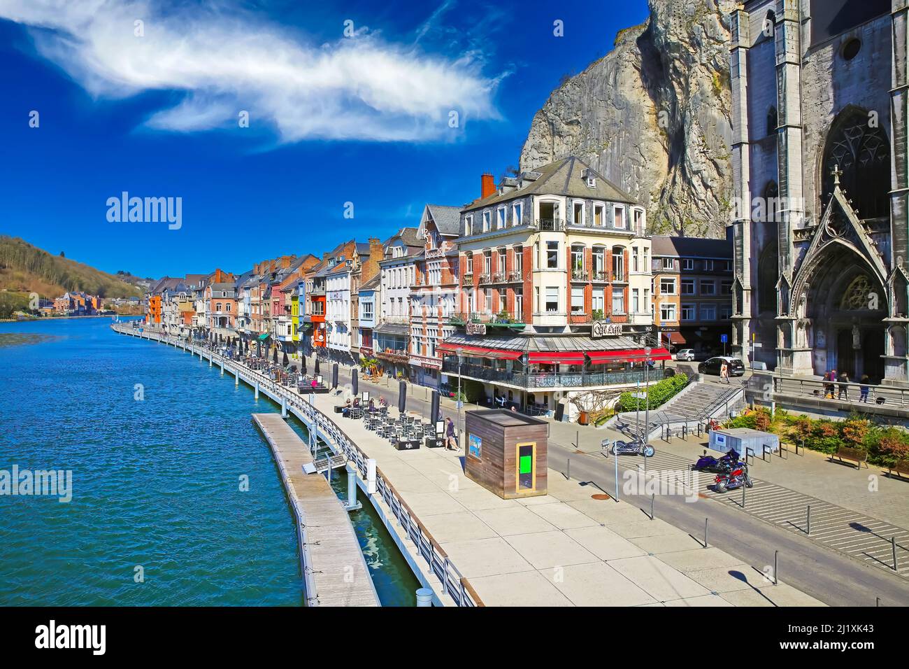 Dinant, Belgium - March 9. 2022: View beyond gothic church, rock face ...