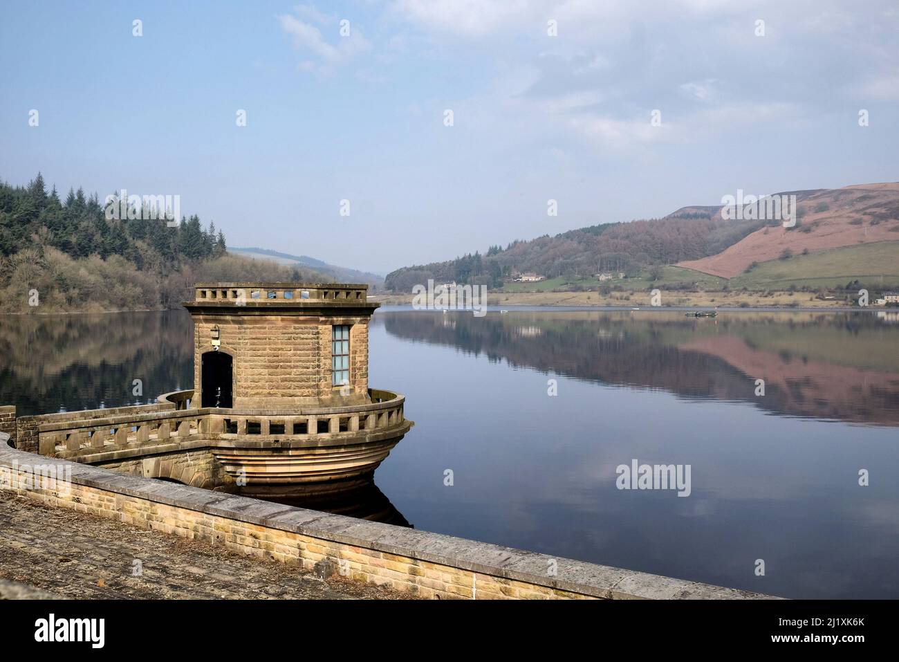 Water outlet tower on the Ladybower Reservoir dam, in the Dark Peak of ...