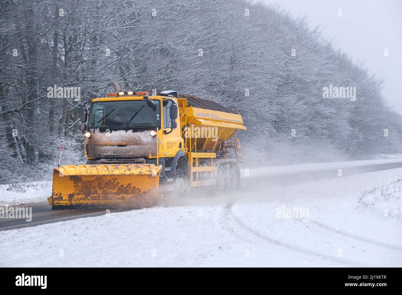 A snow plough clearing the A417 outside of Cirencester after heavy ...