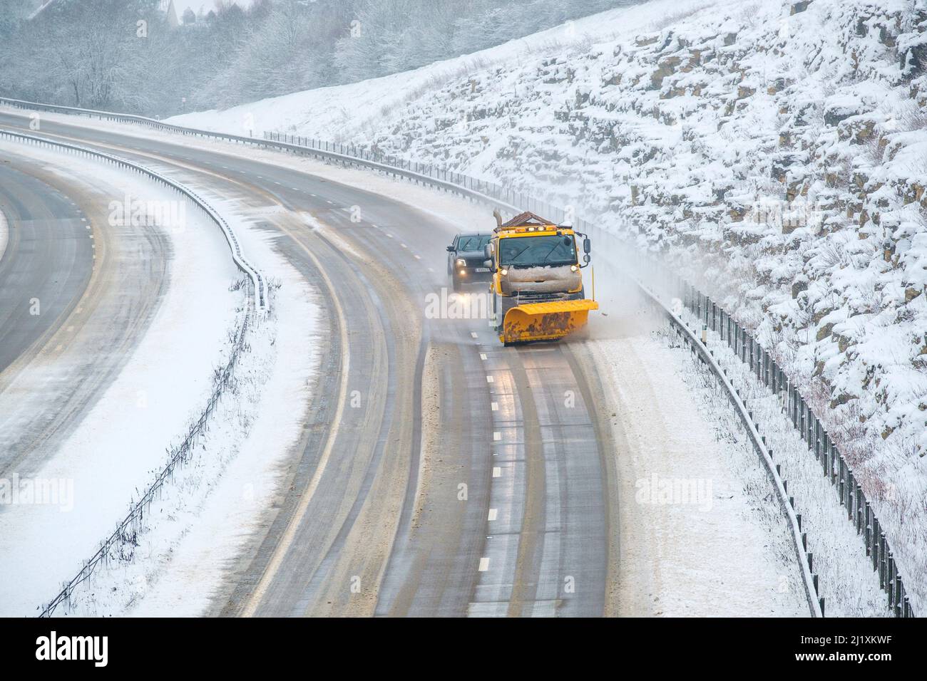 A snow plough clearing the A417 outside of Cirencester after heavy ...