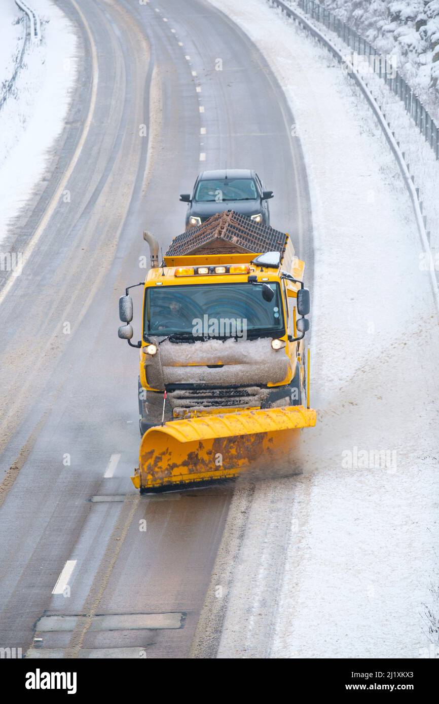 A snow plough clearing the A417 outside of Cirencester after heavy ...