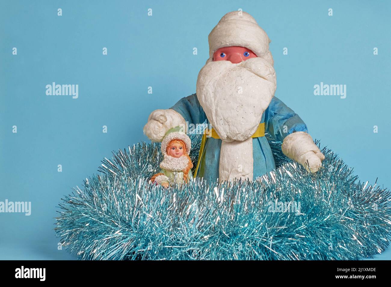 A toy Russian Snow Maiden, Ded Moroz and christmas tree tinsel Stock ...