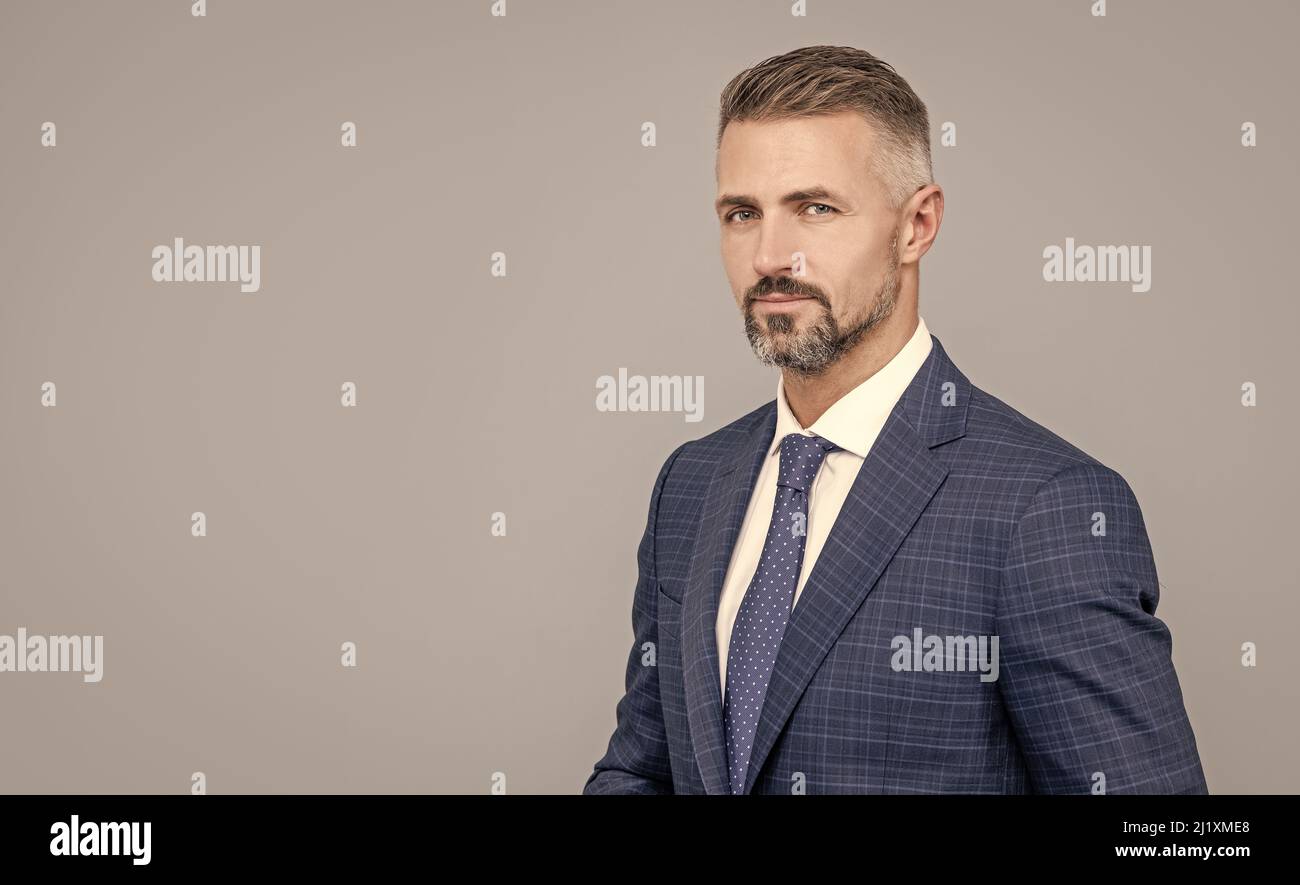 mature man with grizzled hair in formal suit copy space, formal Stock ...
