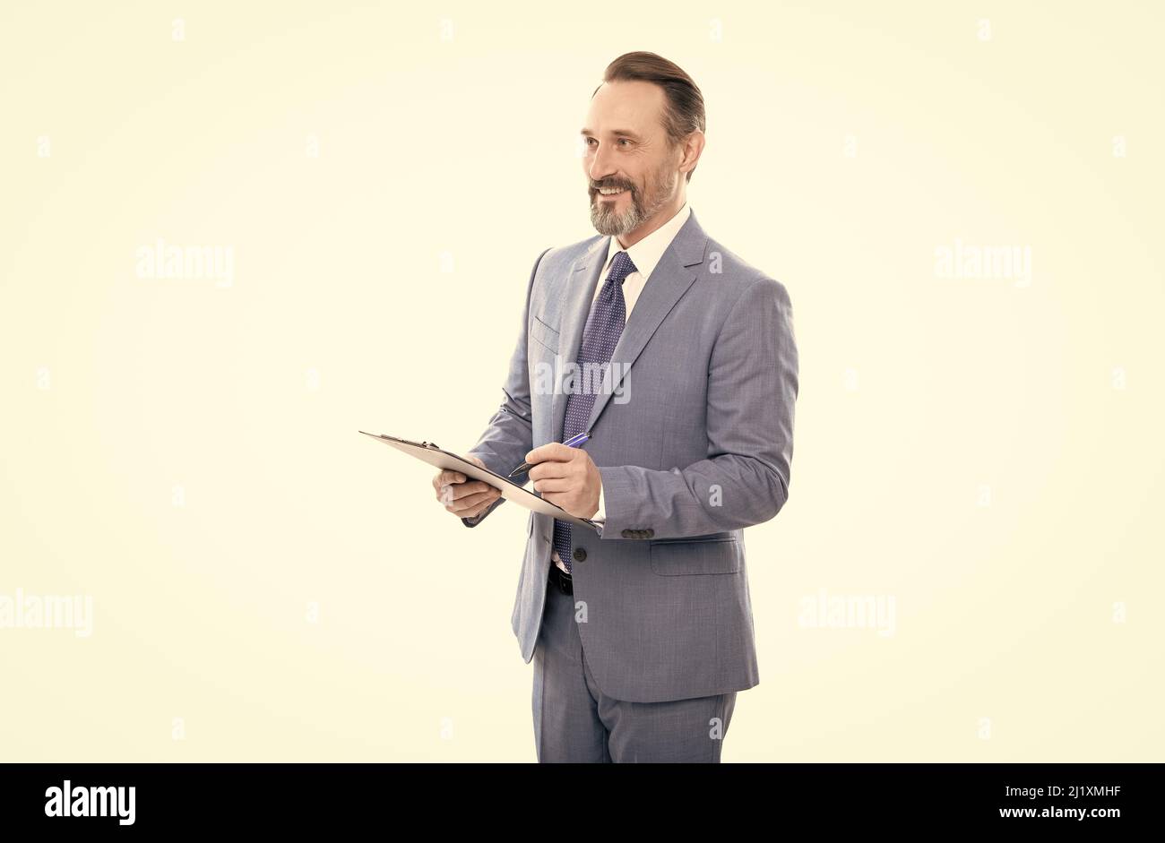 happy man making notes or signing contract on folder documents isolated ...