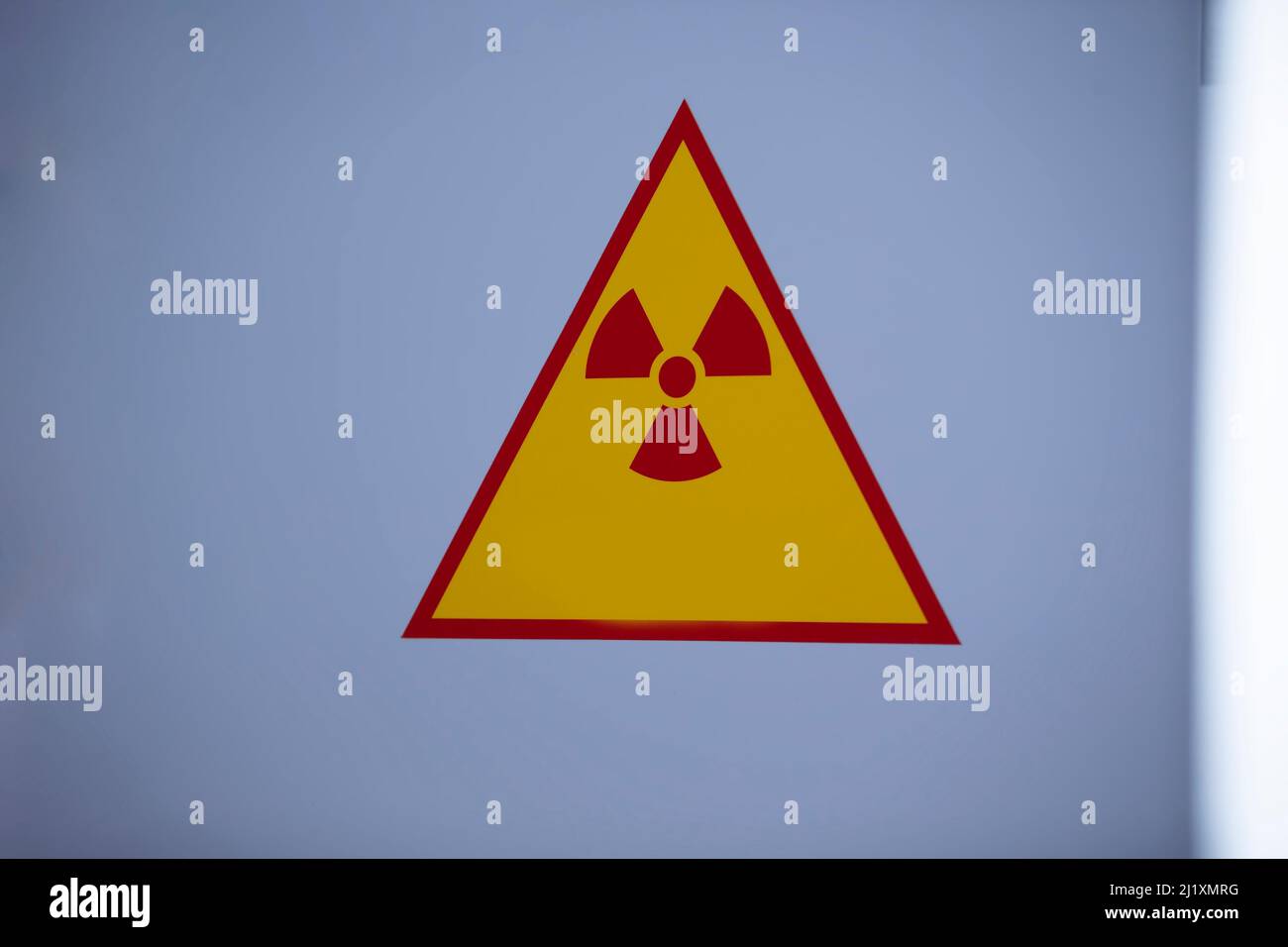 Radiation sign on the doors in the hospital. High radiation warning ...