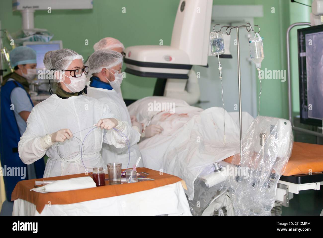 Surgical operating room in a hospital with doctors who perform surgery ...