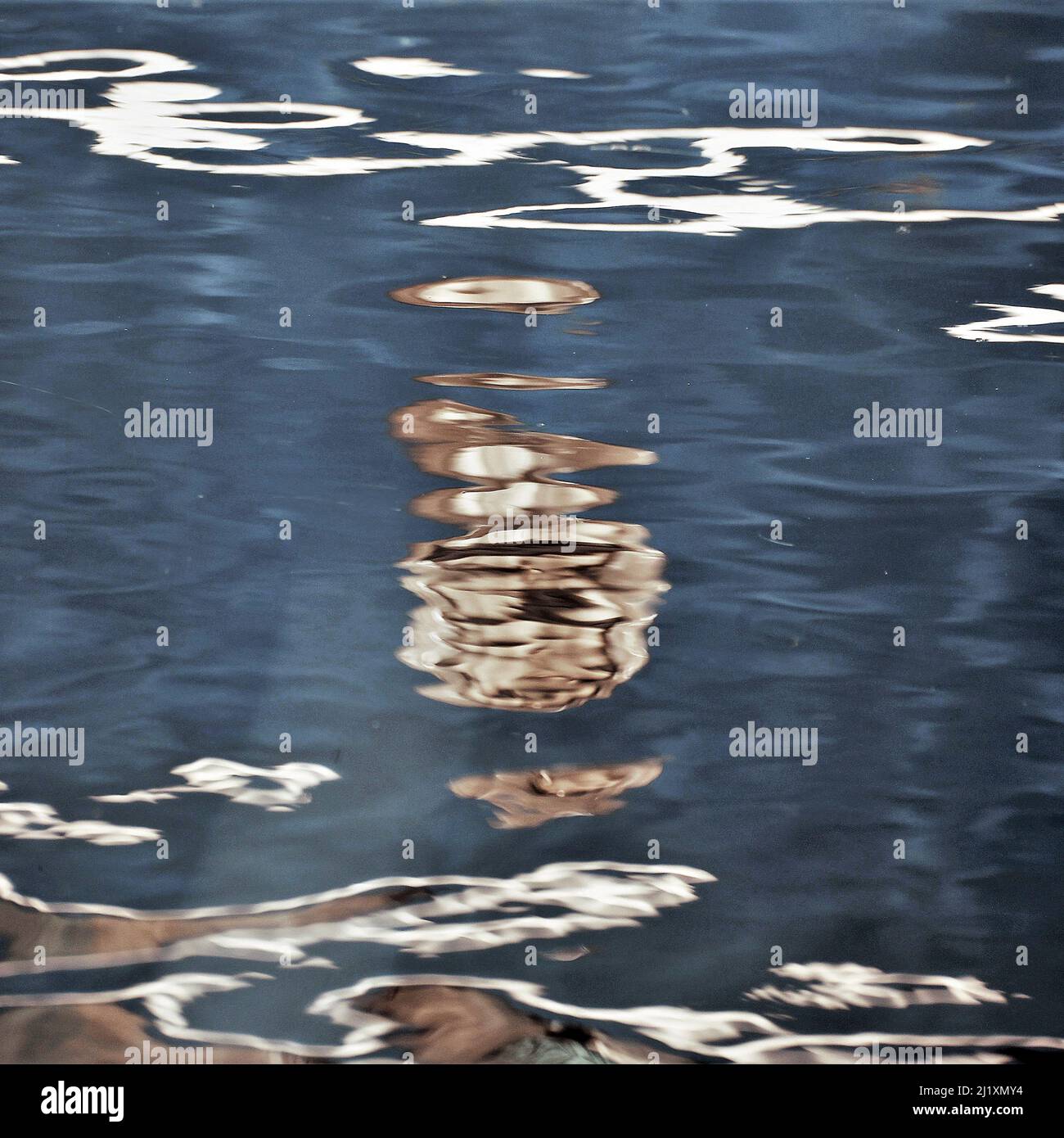 Abstract photograph, showing reflected pattern, line, shape, with a ...