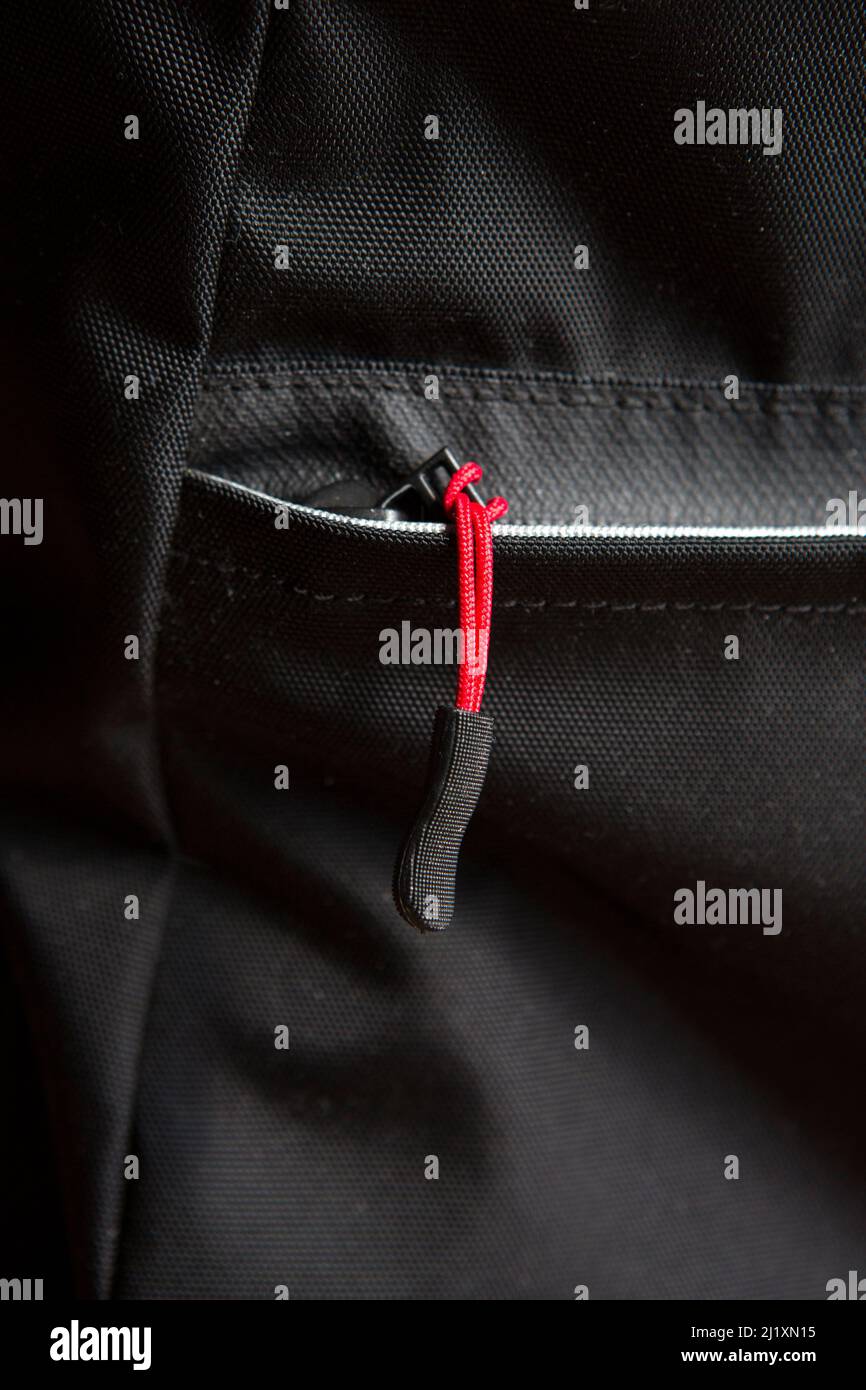 Zipper puller hi-res stock photography and images - Alamy