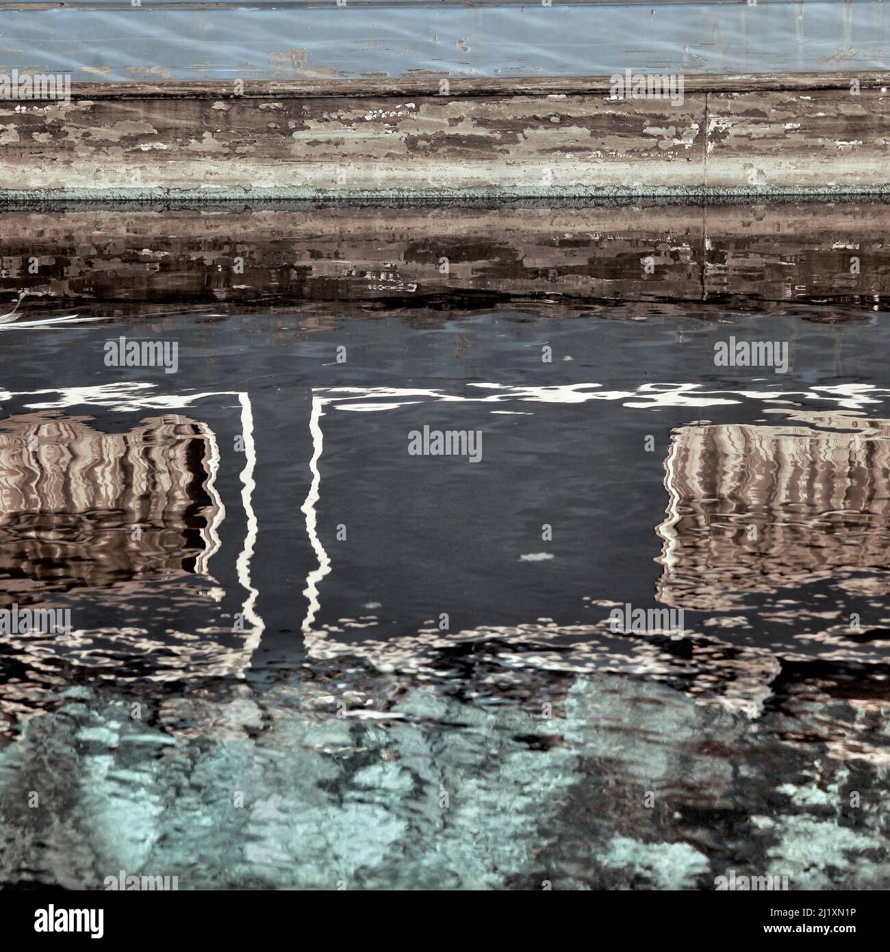 Abstract photograph, showing reflected pattern, line, shape, with a ...