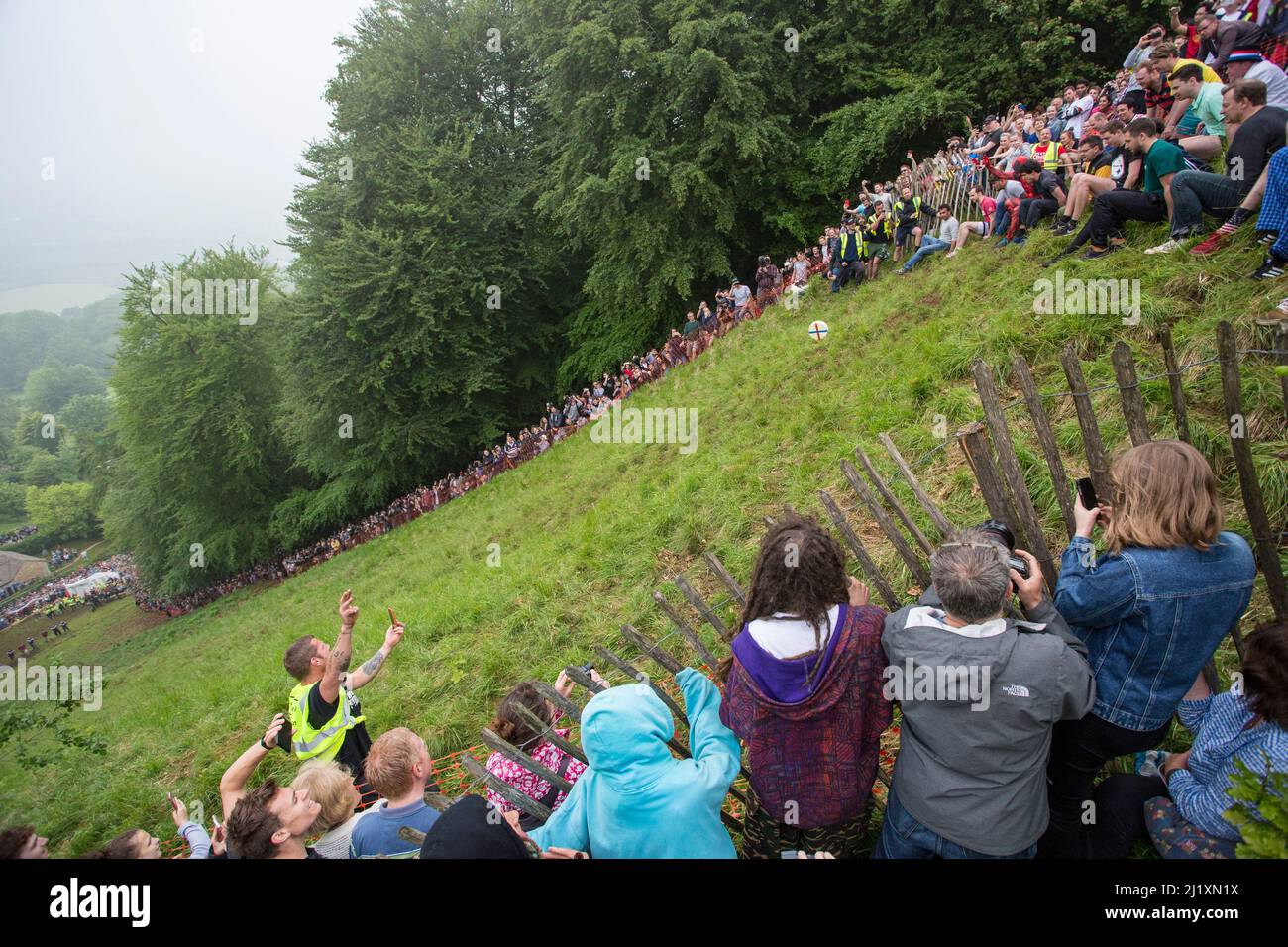 Gloucester, UK. The annual cheese rolling race held at Coopers Hill ...