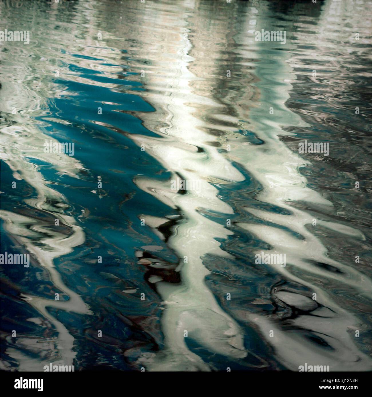 Abstract photograph, showing reflected pattern, line, shape, with a ...