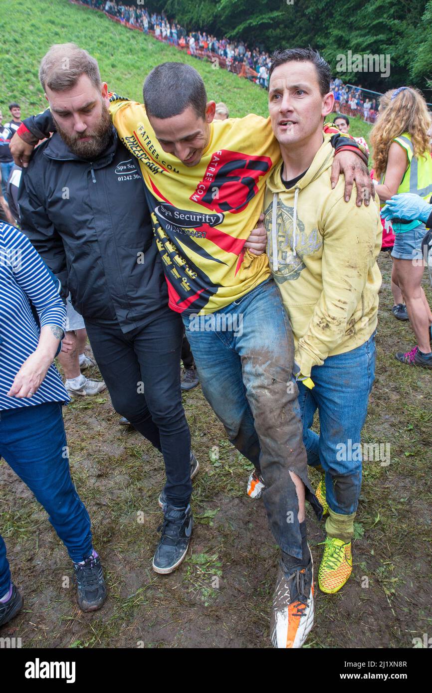 Gloucester, UK. The annual cheese rolling race held at Coopers Hill ...