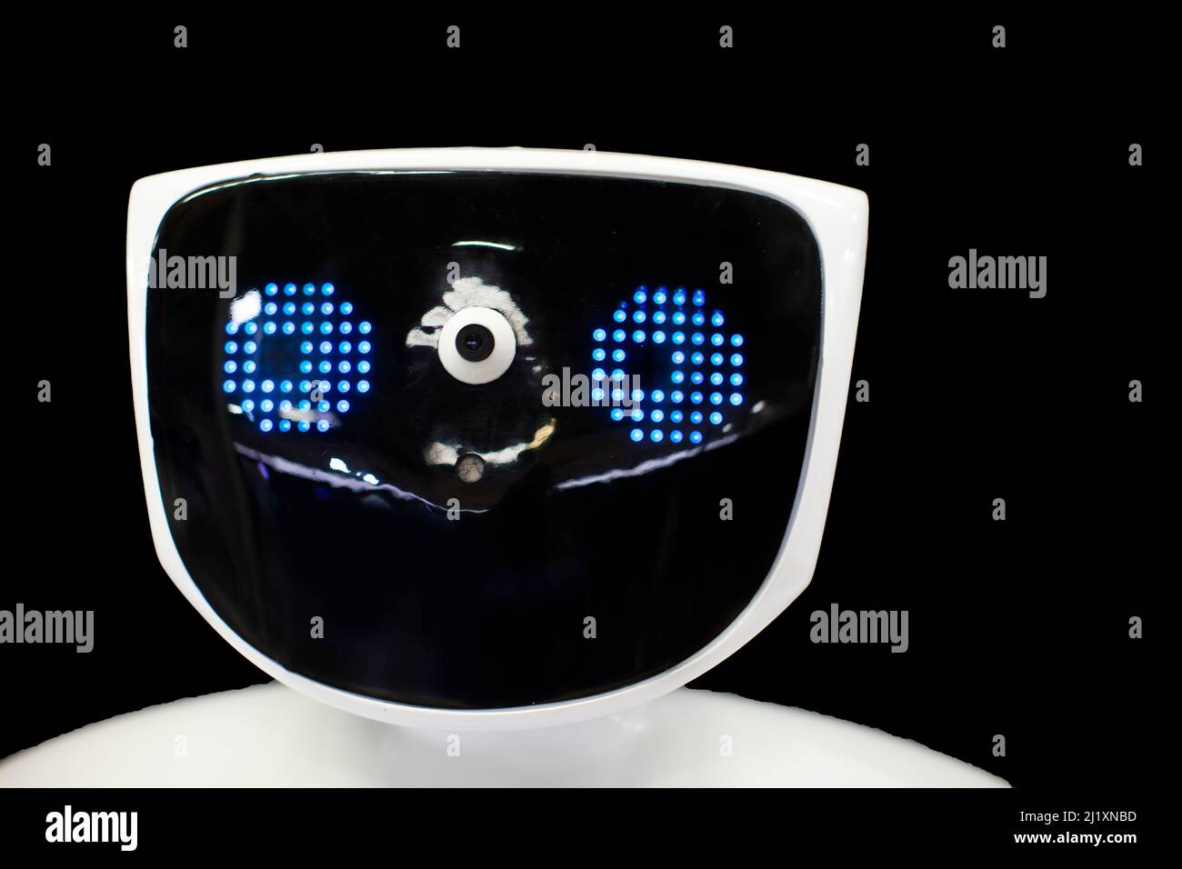 Robot face with electronic eyes on a black background Stock Photo - Alamy