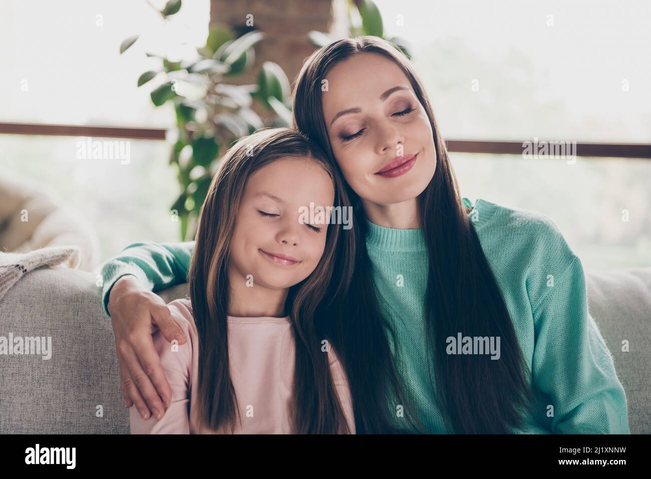 Photo of family bonding harmony concept lady cuddle small girl close ...