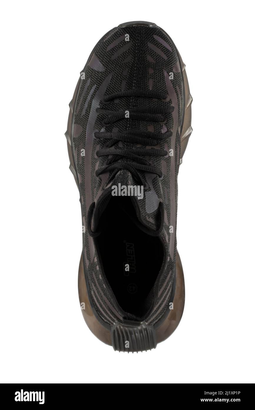 Black rag sneaker on a white background Stock Photo - Alamy