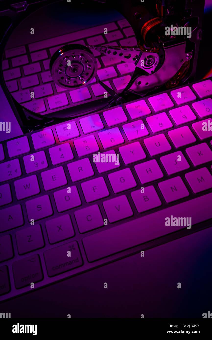 Close up of the open case of a computer hard drive showing the disc and ...