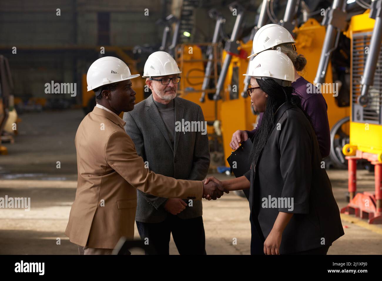 Woman shaking hands mechanic hi-res stock photography and images - Alamy