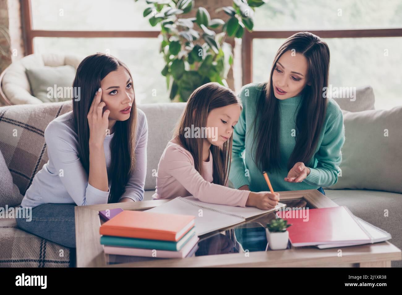 Photo of troubling study concept little girl need homework assistance ...