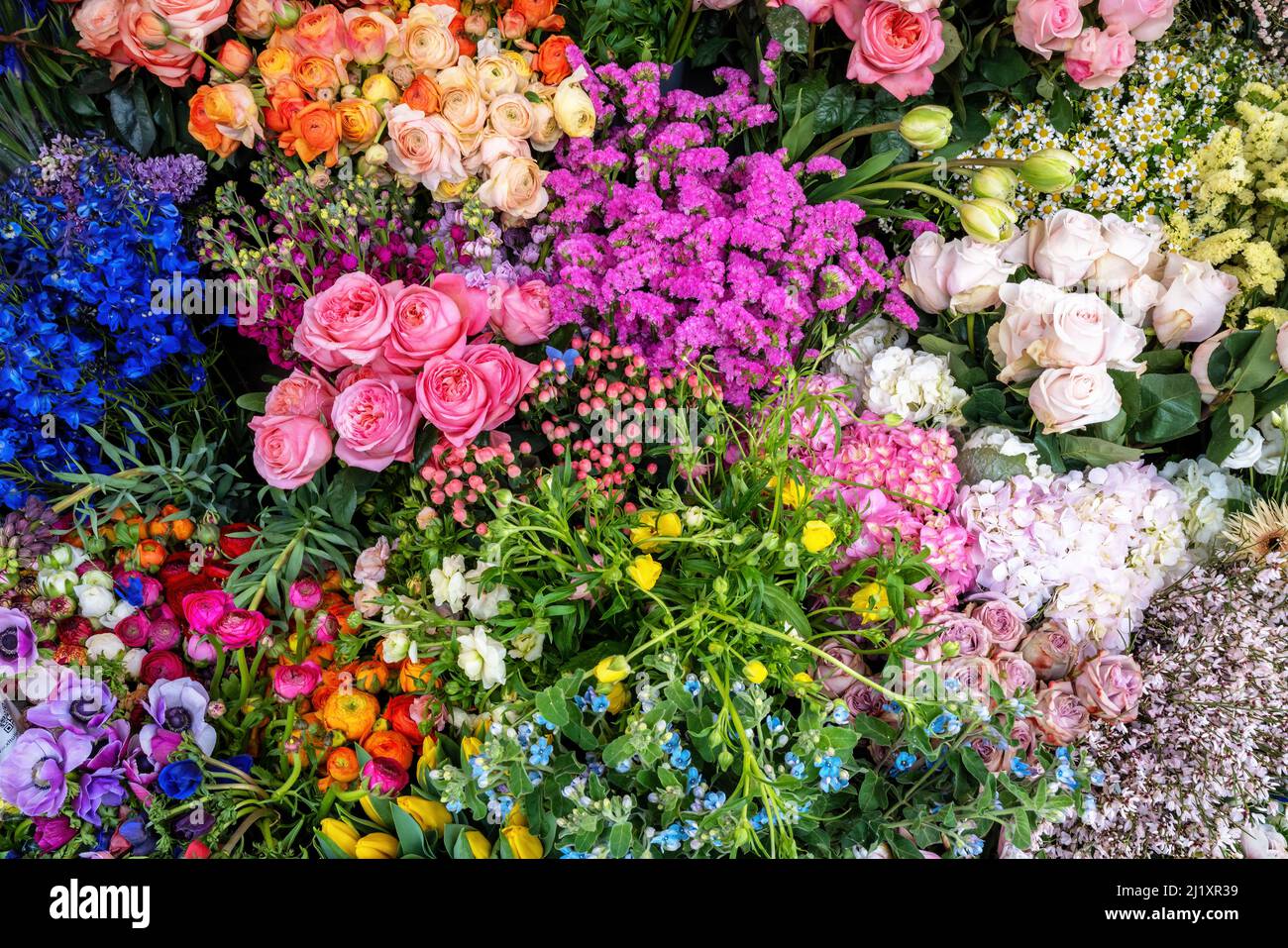 Beautiful background of flowers at a street market, a variety of ...