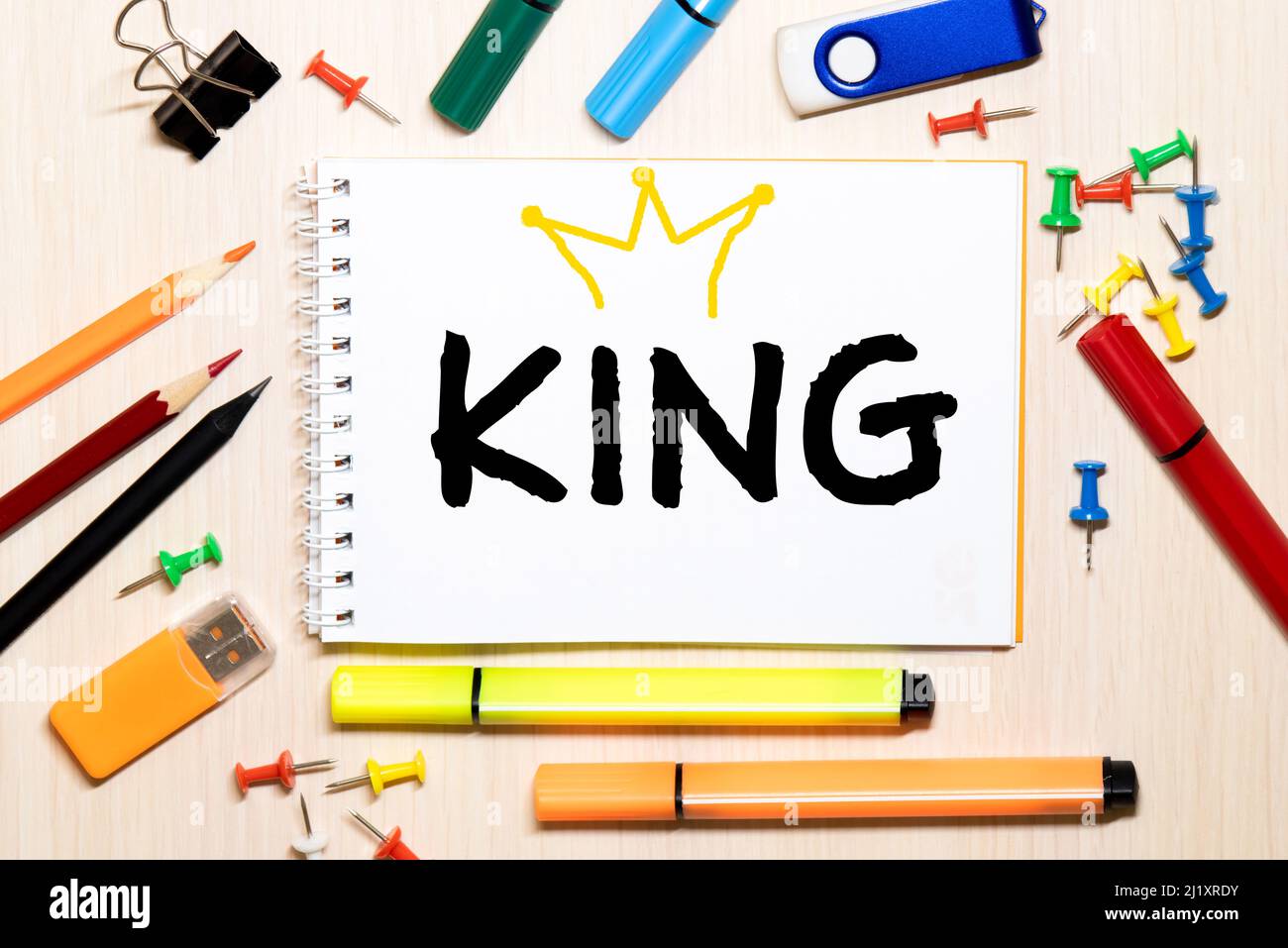 Yellow stencil letters KING on concrete. concept Stock Photo - Alamy