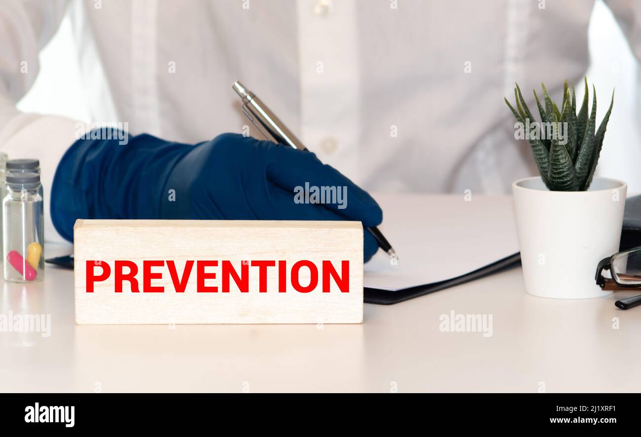 PREVENTION word on the wooden board, medical concept Stock Photo - Alamy