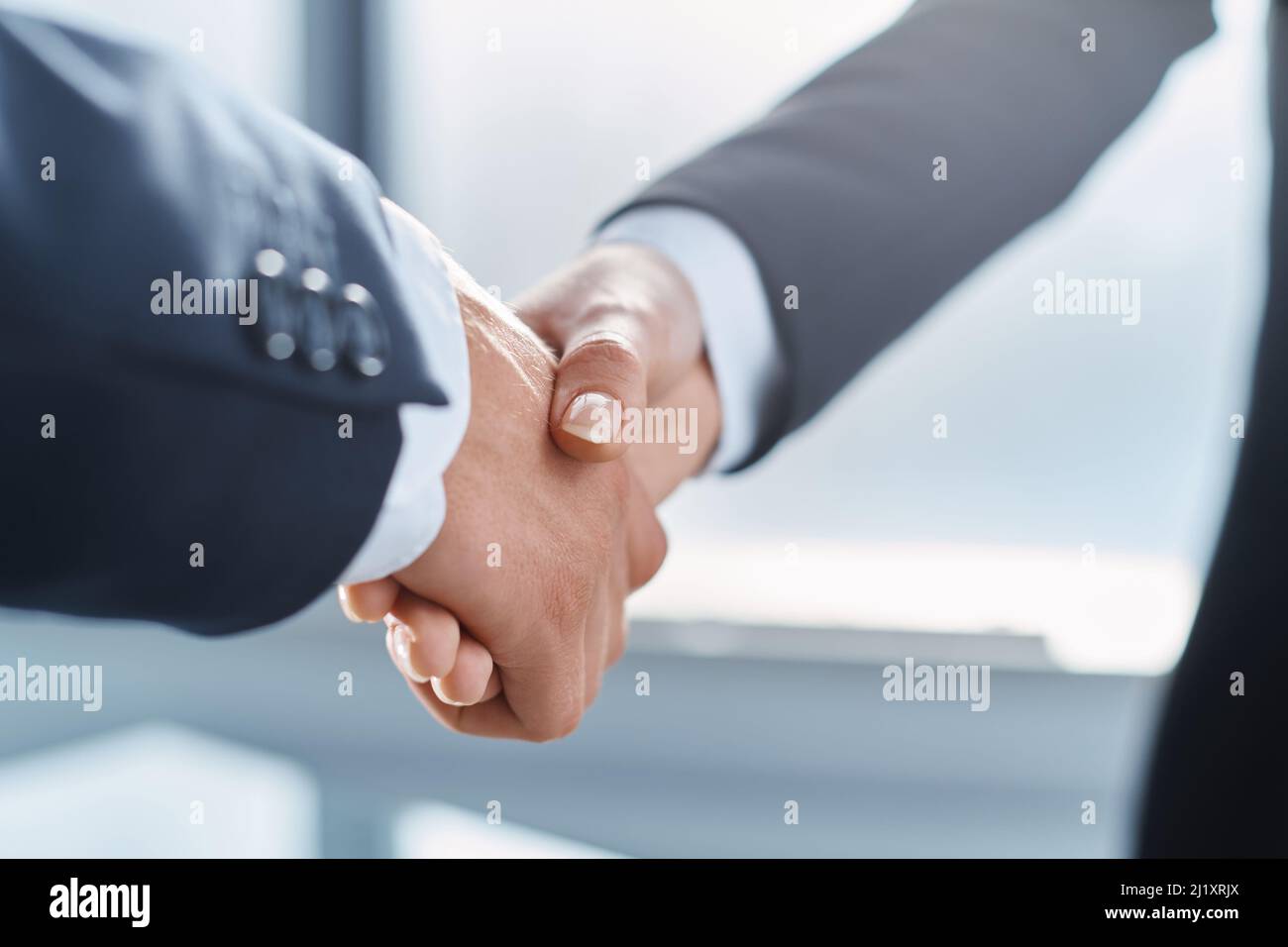 confident business handshake. concept of cooperation and partnership ...