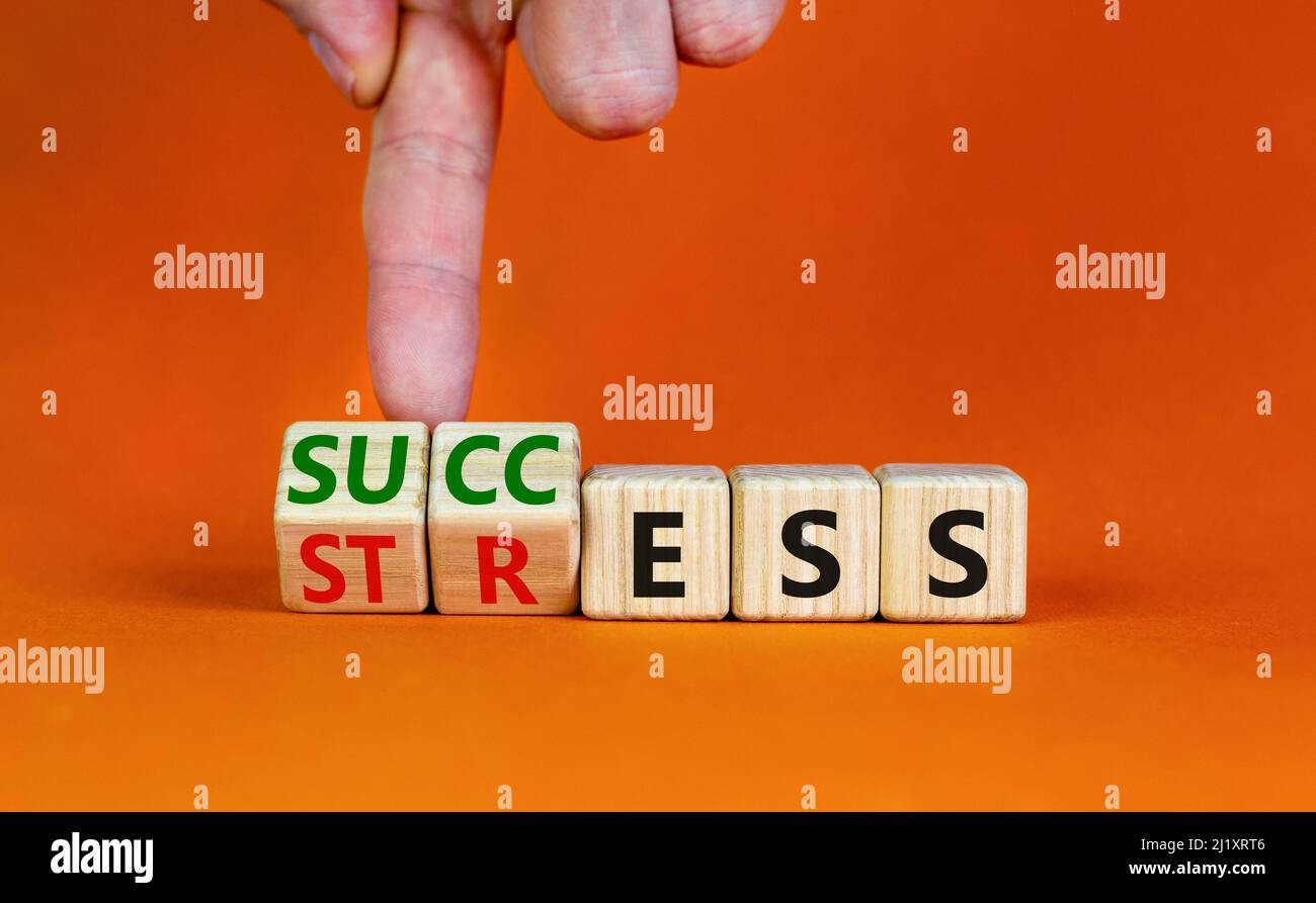 Success instead of stress symbol. Businessman turns cubes and changes ...