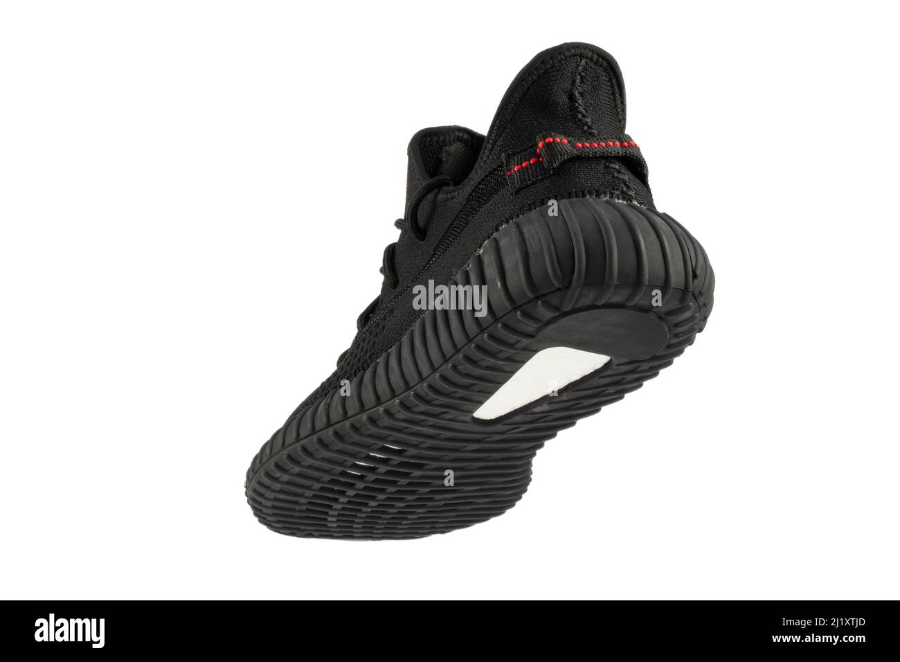 Black rag sneaker on a white background Stock Photo - Alamy