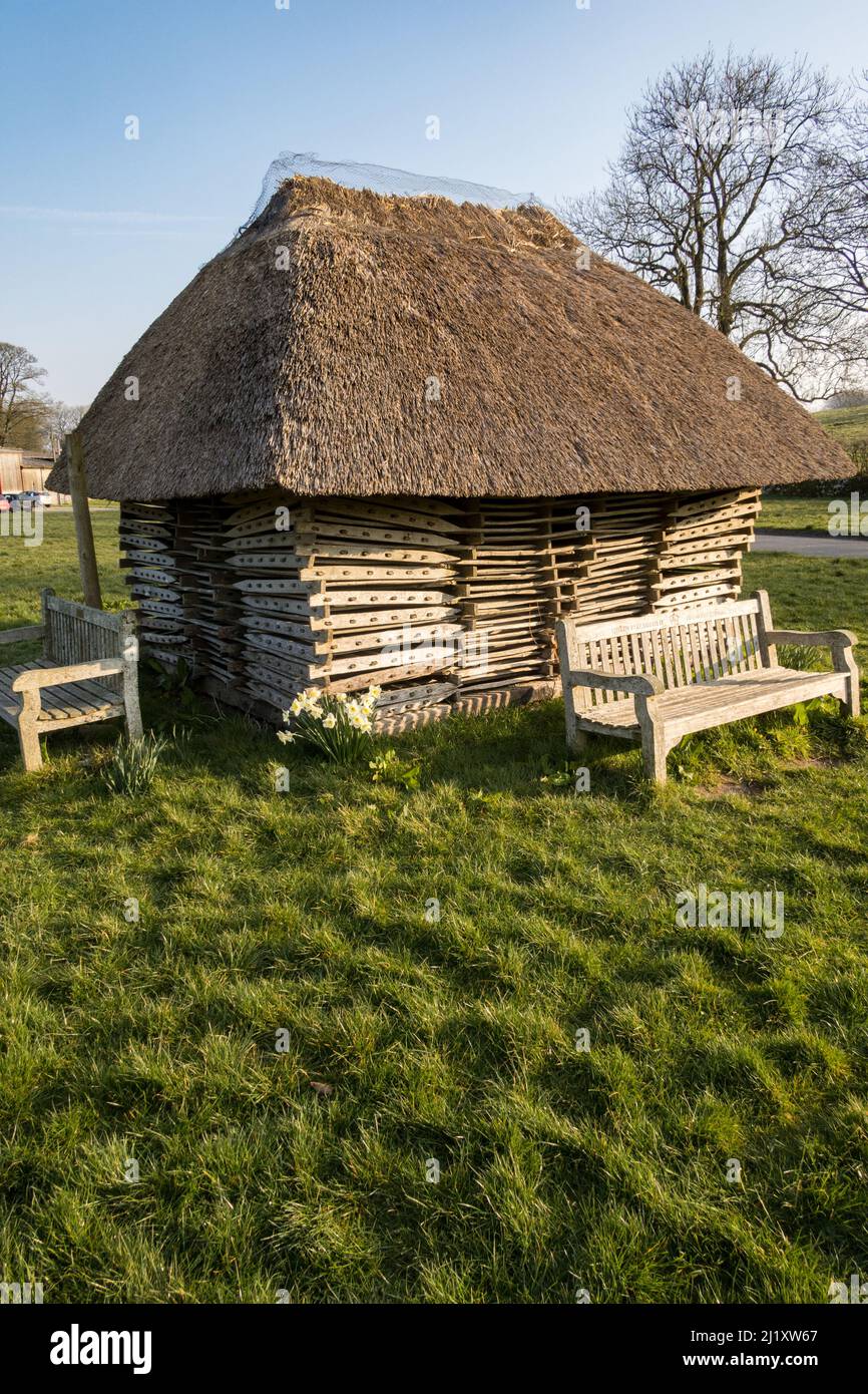 UK, England, Somerset. Priddy village green. A stack of Hurdles was ...