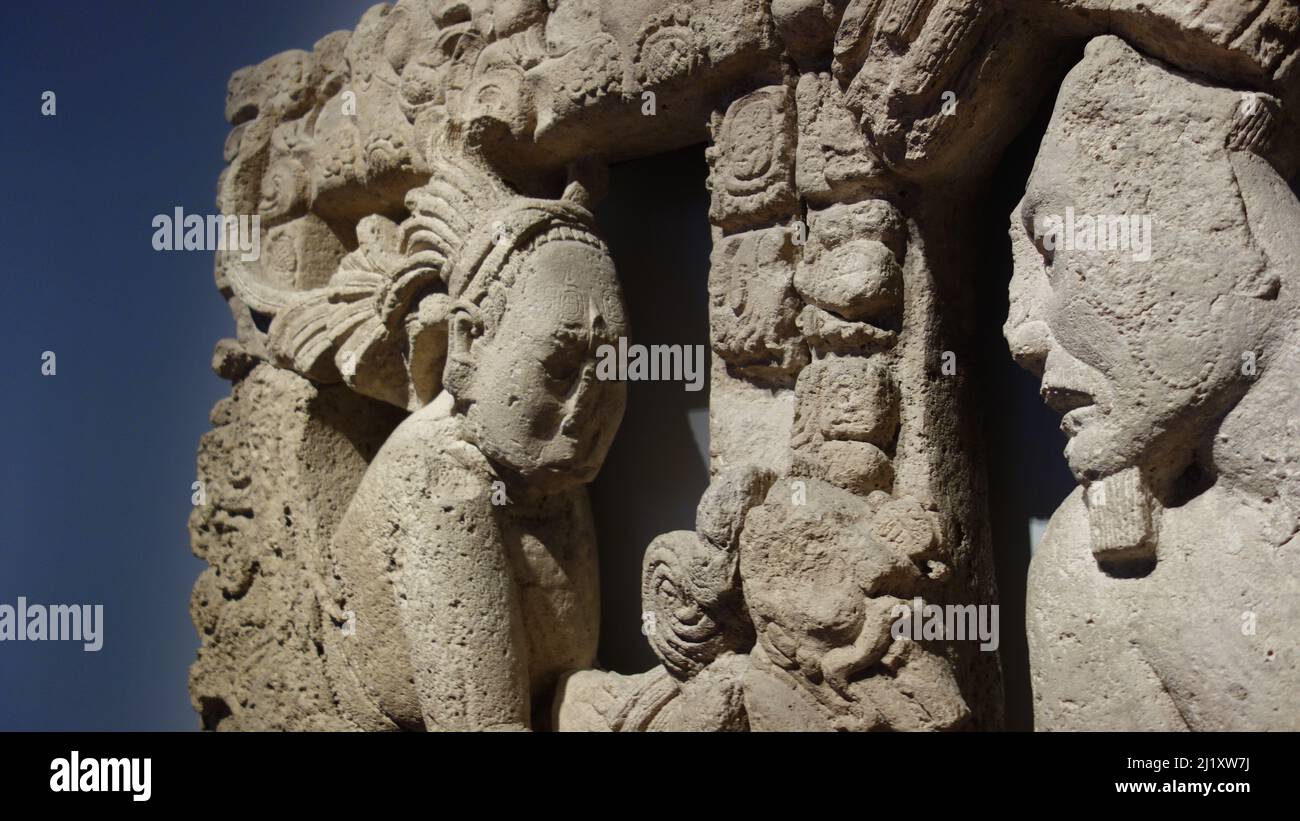 Back of a throne with a sovereign, a courtier and a deity in the center ...