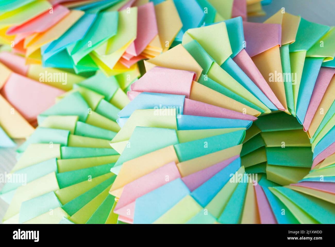 Origami background, ring structures made of linked colorful paper ...