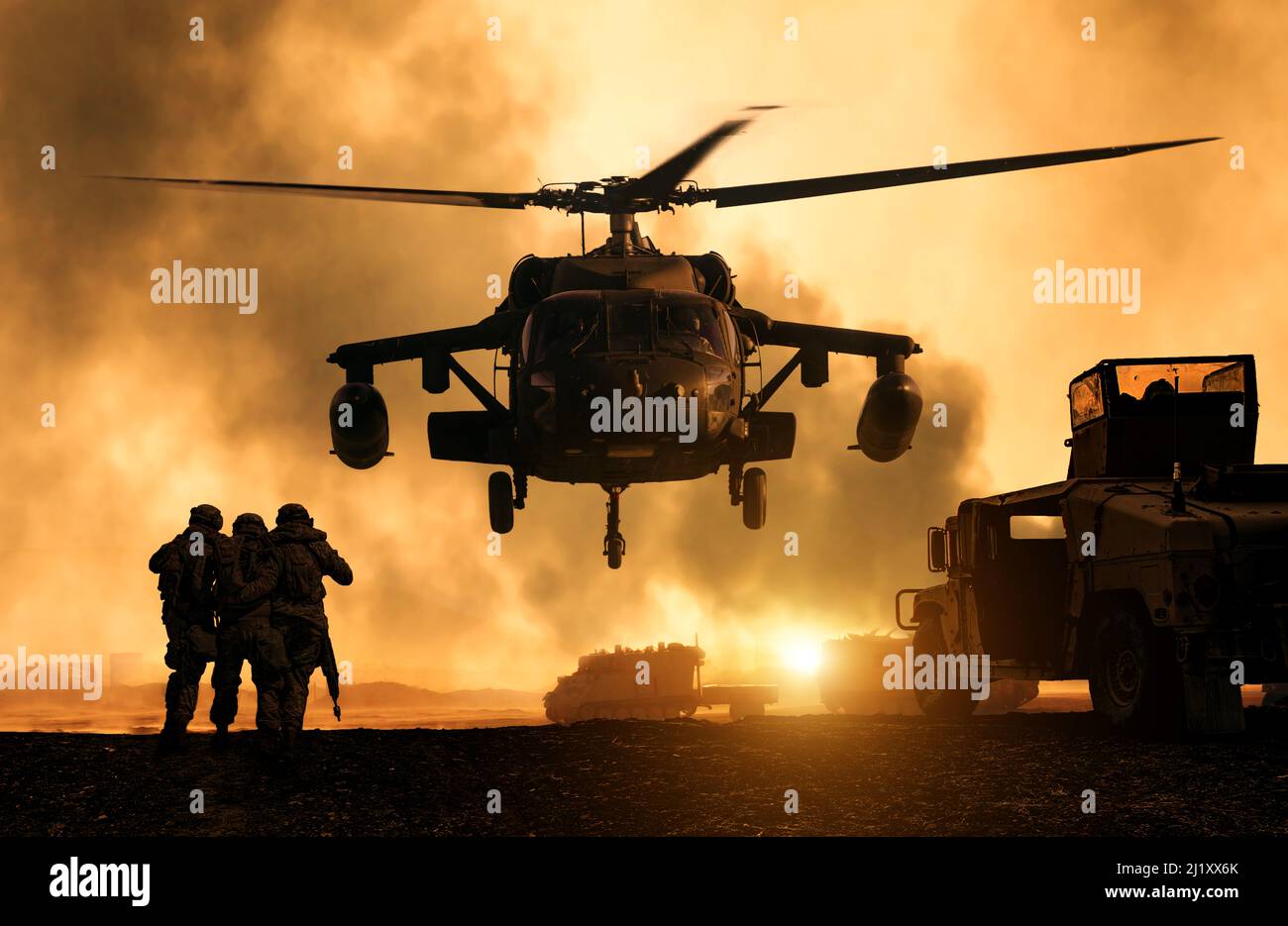 2 soldiers helping wounded soldier between dust in battle field to ...