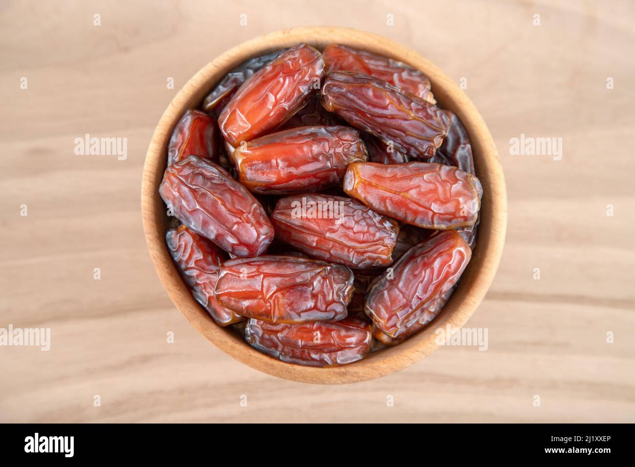 Fresh dates in wooden hi-res stock photography and images - Alamy