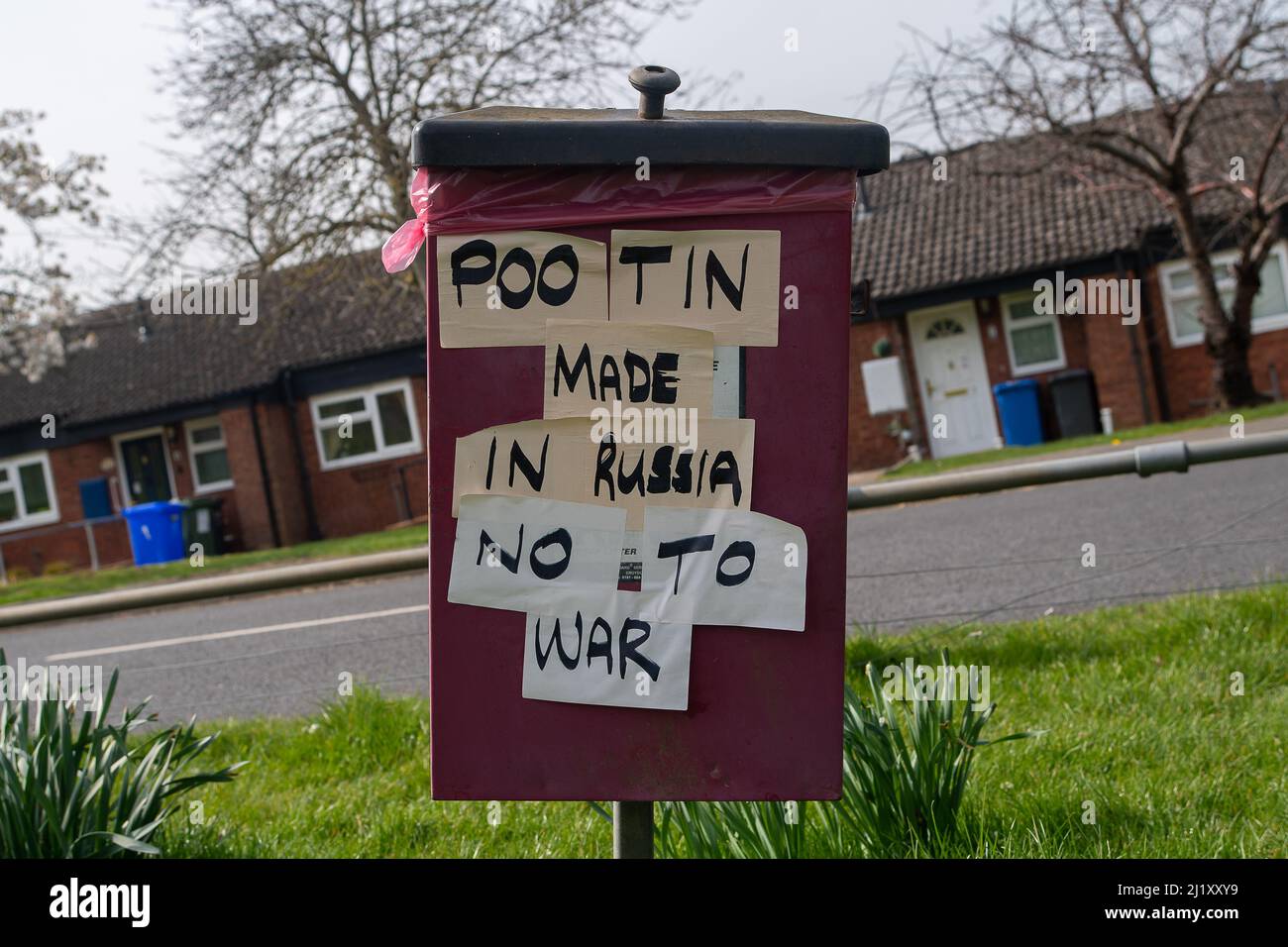 Windsor, Berkshire, UK. 28th March, 2022. Poo Tin stickers have been ...