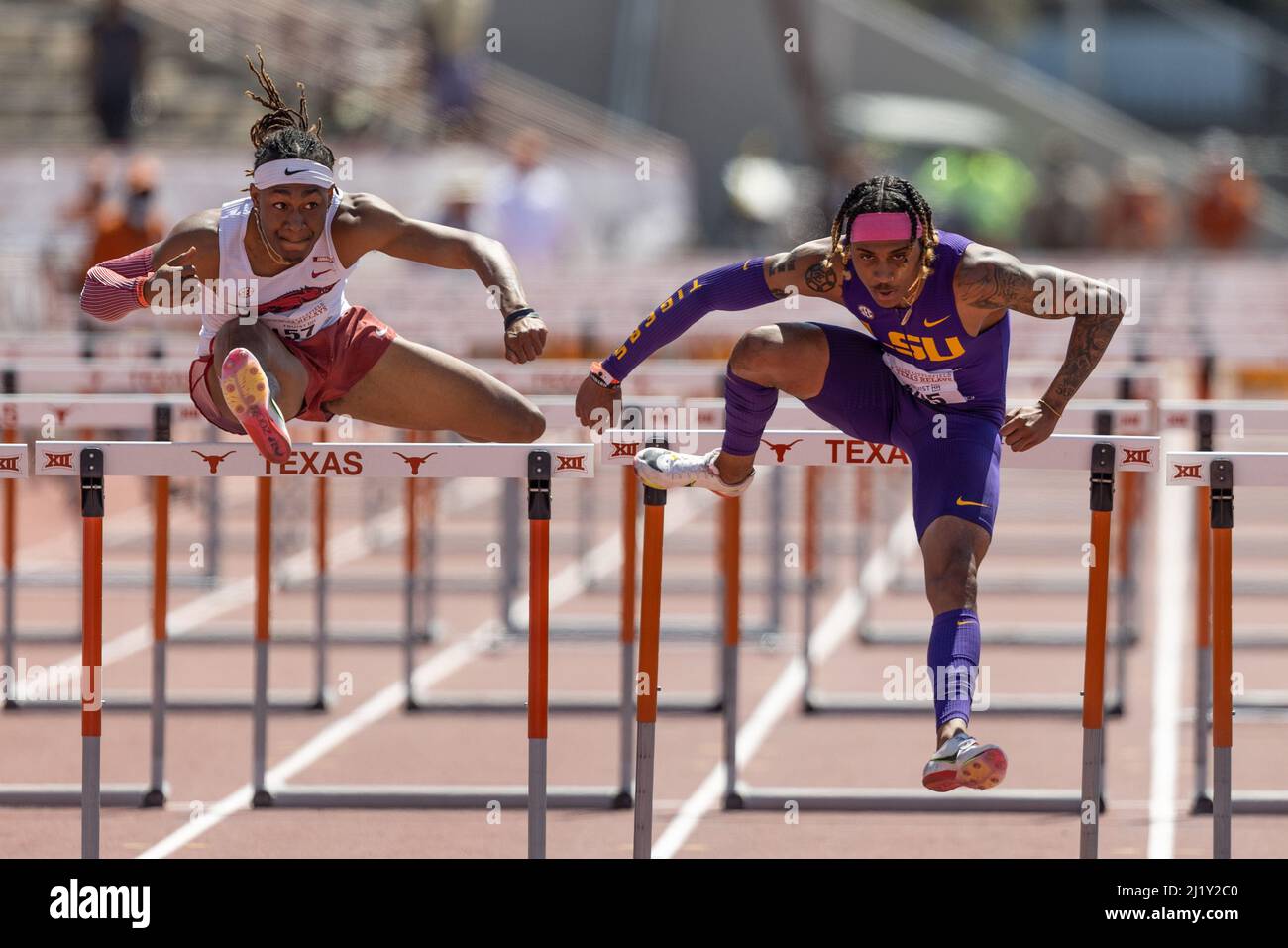 Eric Edwards Jr. of LSU clears the last hurdle just ahead of Tre’Bien ...