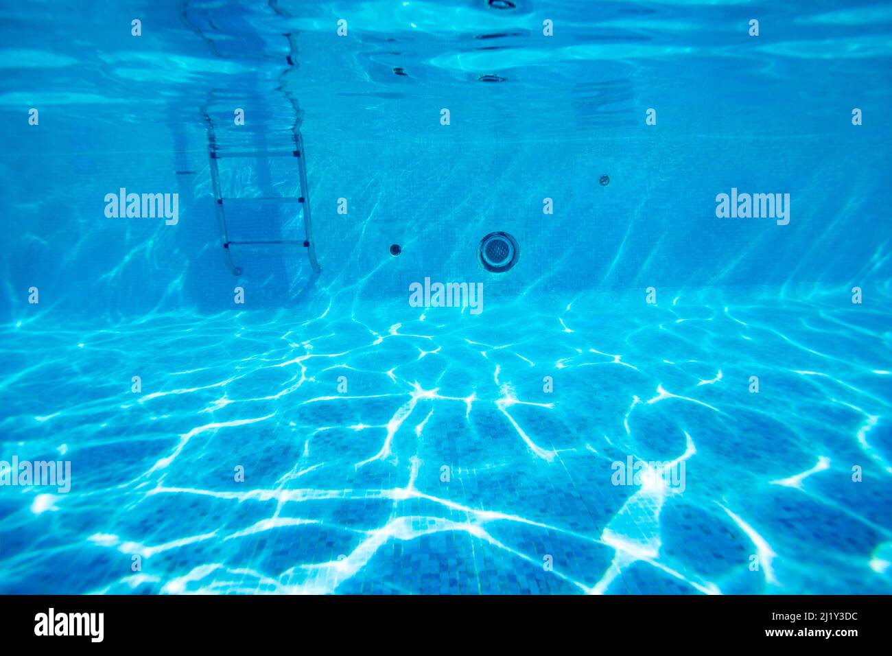 Underwater pool floor photo of rails and ladder stairs Stock Photo - Alamy