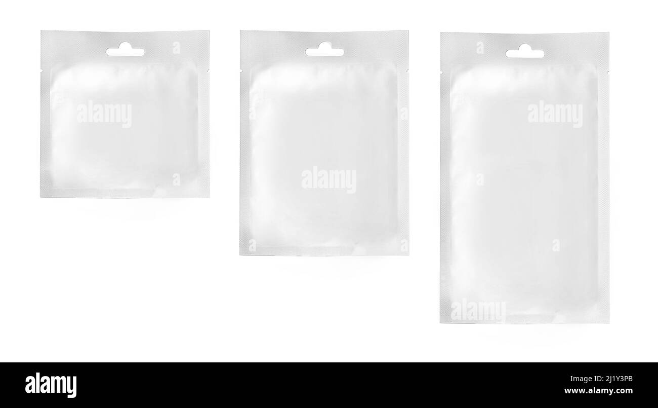 close up set of white paper packages bag on white background Stock ...