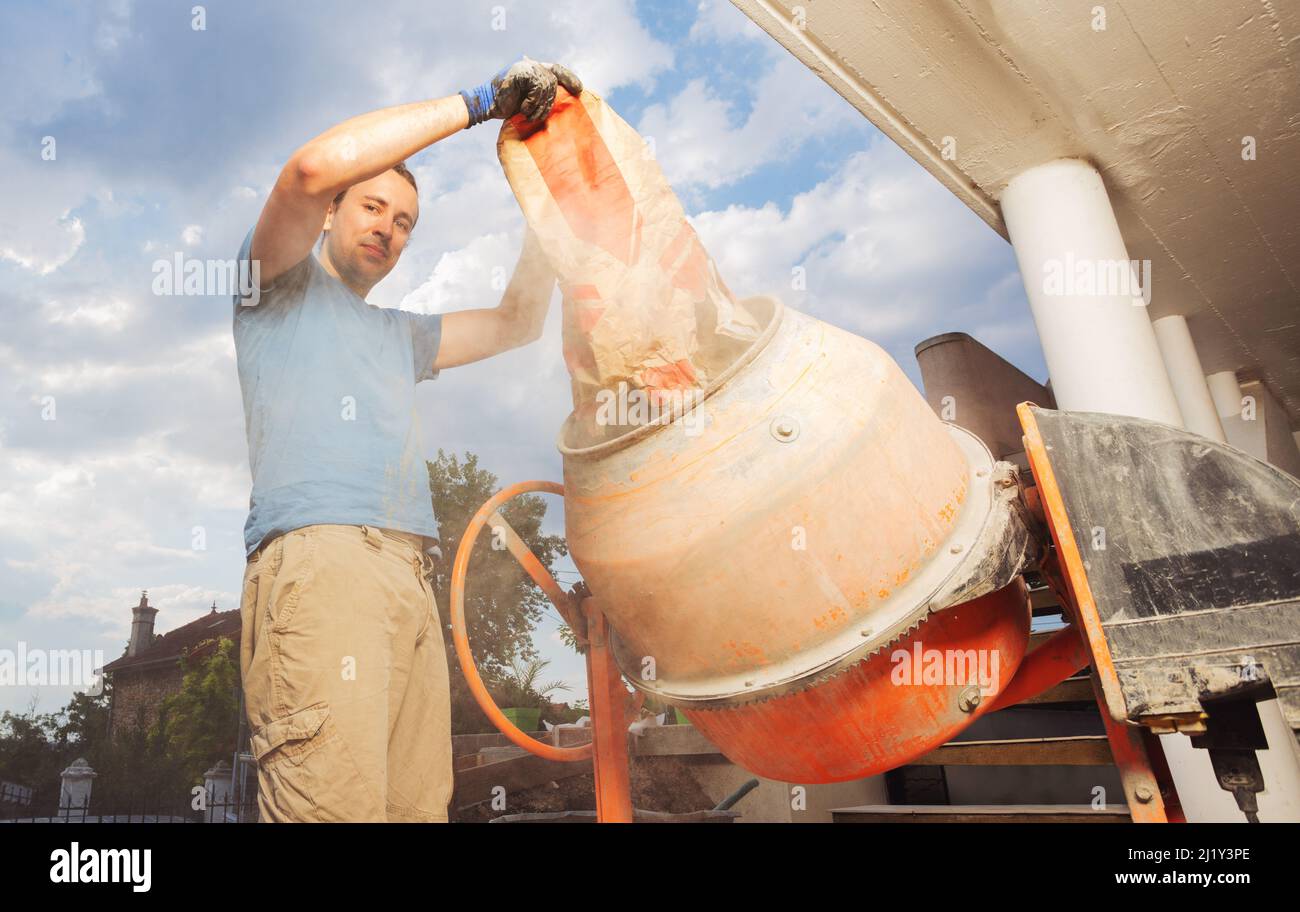 Man mixing cement hi-res stock photography and images - Alamy