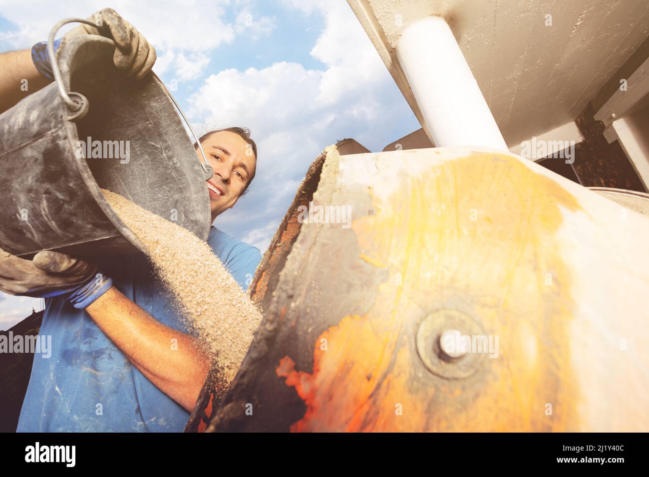Man mixing cement hi-res stock photography and images - Alamy