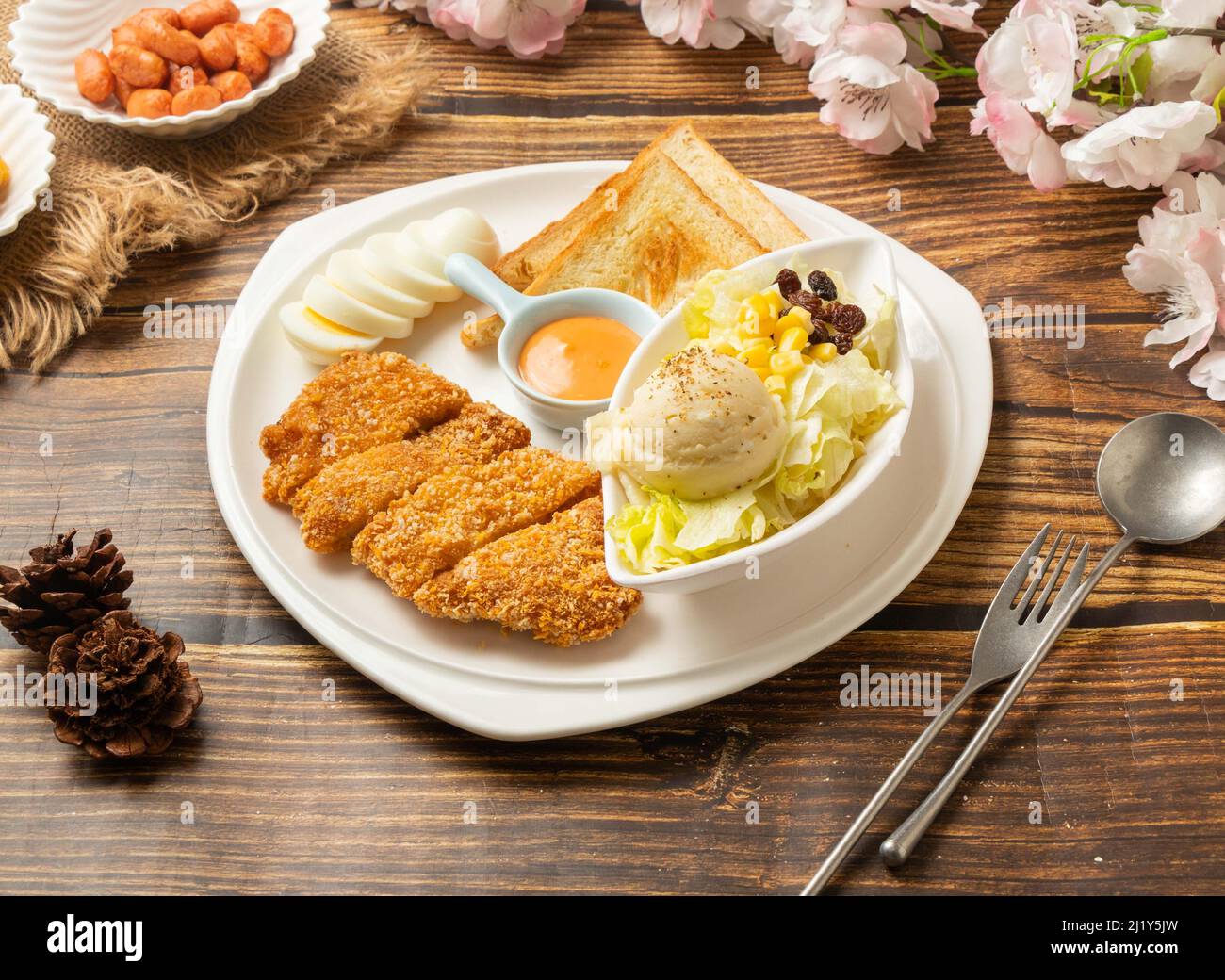 Chicken Cutlet Platter in dish side view on wooden table taiwan style ...