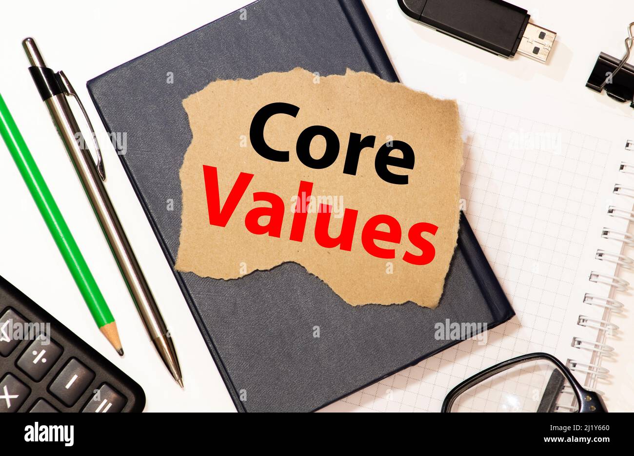 Core Values Message written under torn paper Stock Photo - Alamy