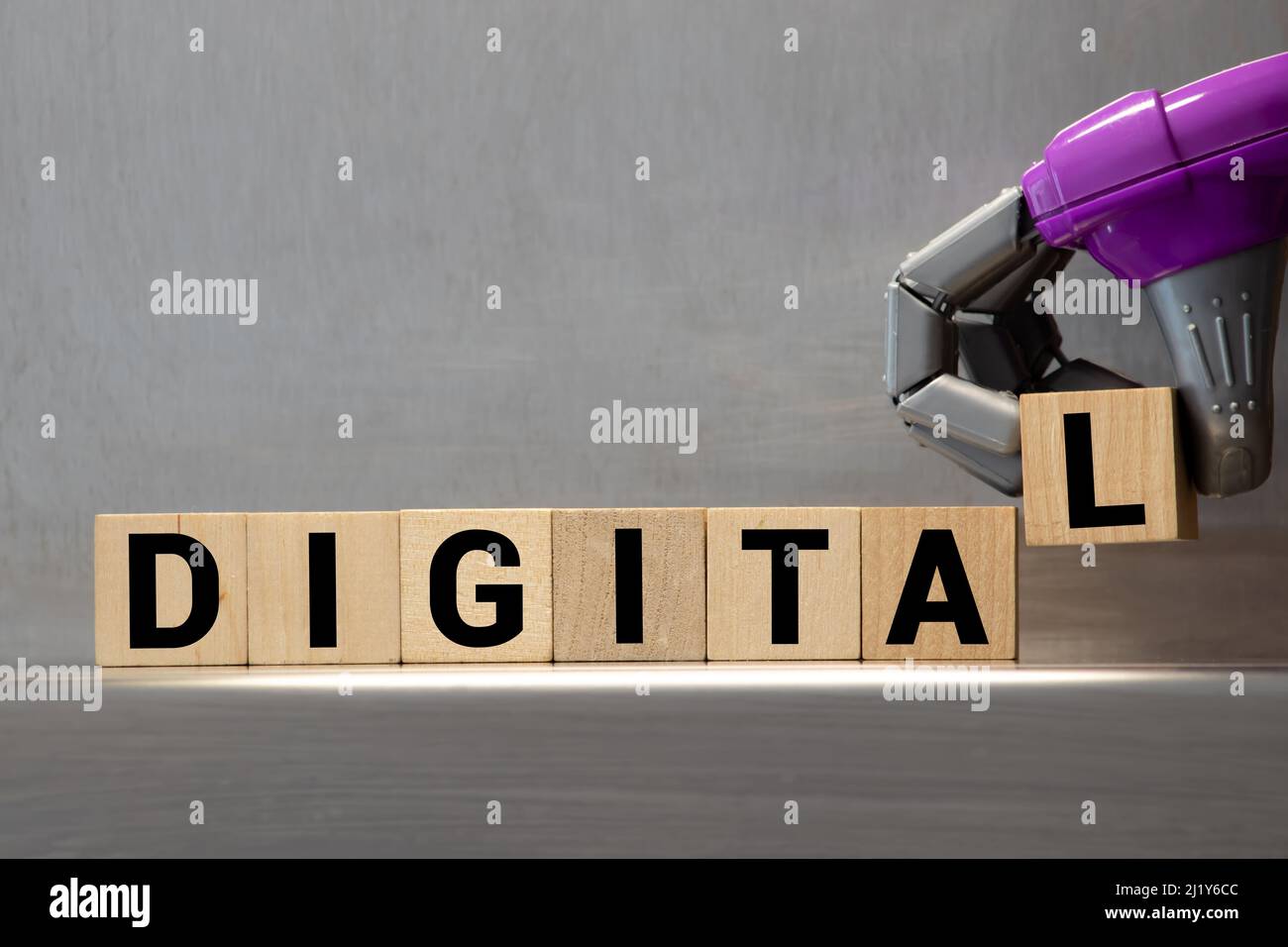 DIGITAL word inscription on wooden cube blocks on a white glossy ...