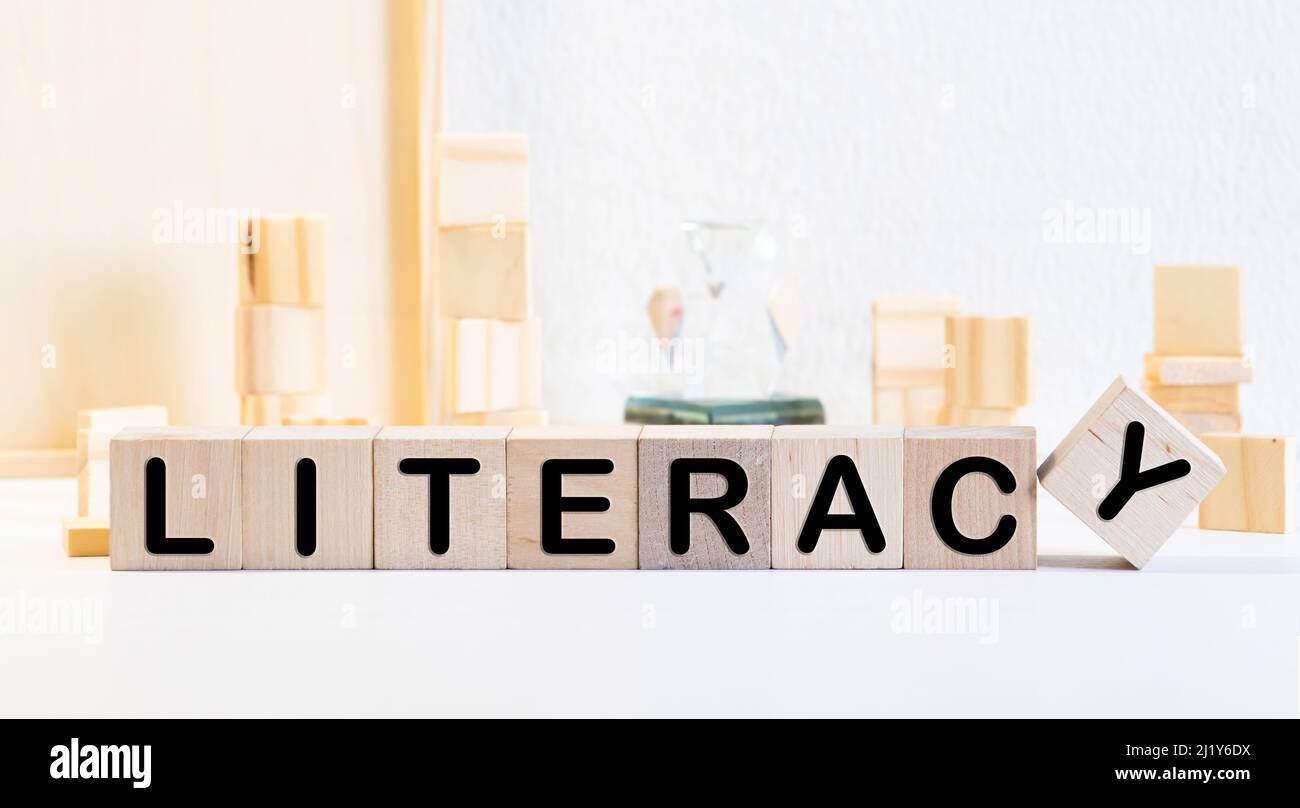 LITERACY word made with building blocks. concept Stock Photo - Alamy